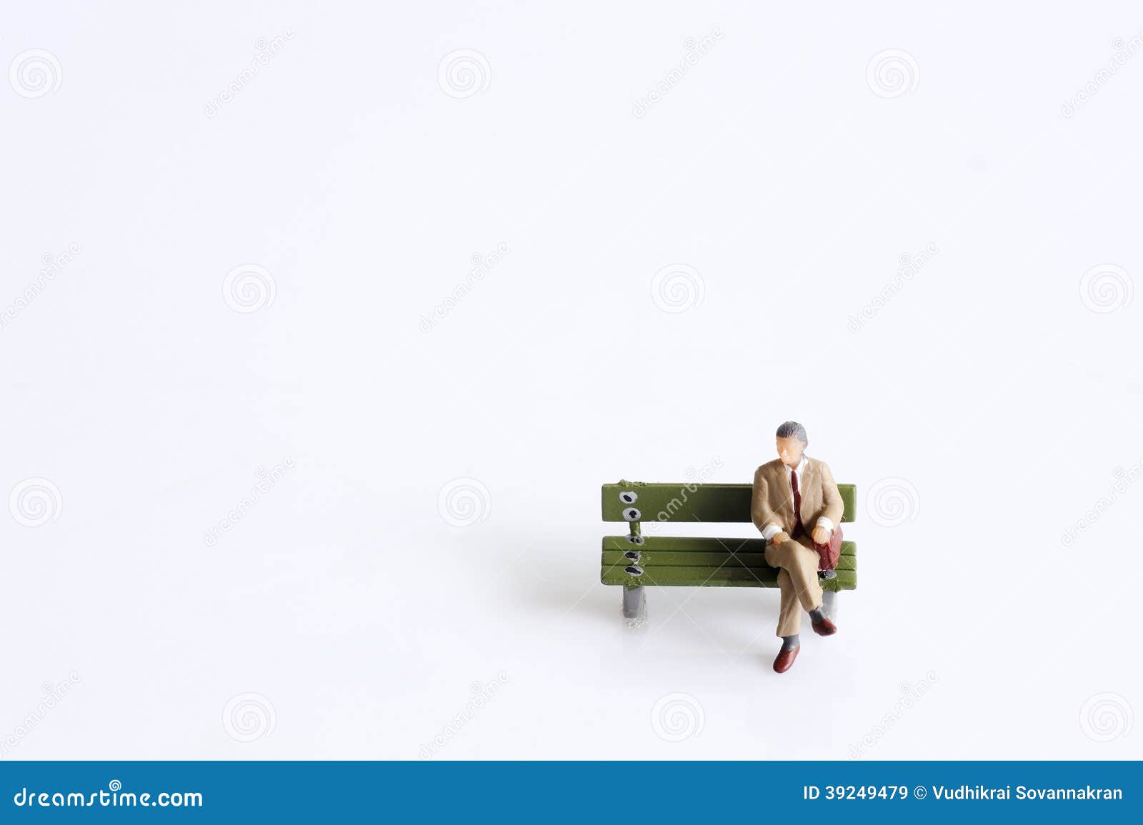 Miniature peoples sitting stock image. Image of sitting - 39249479