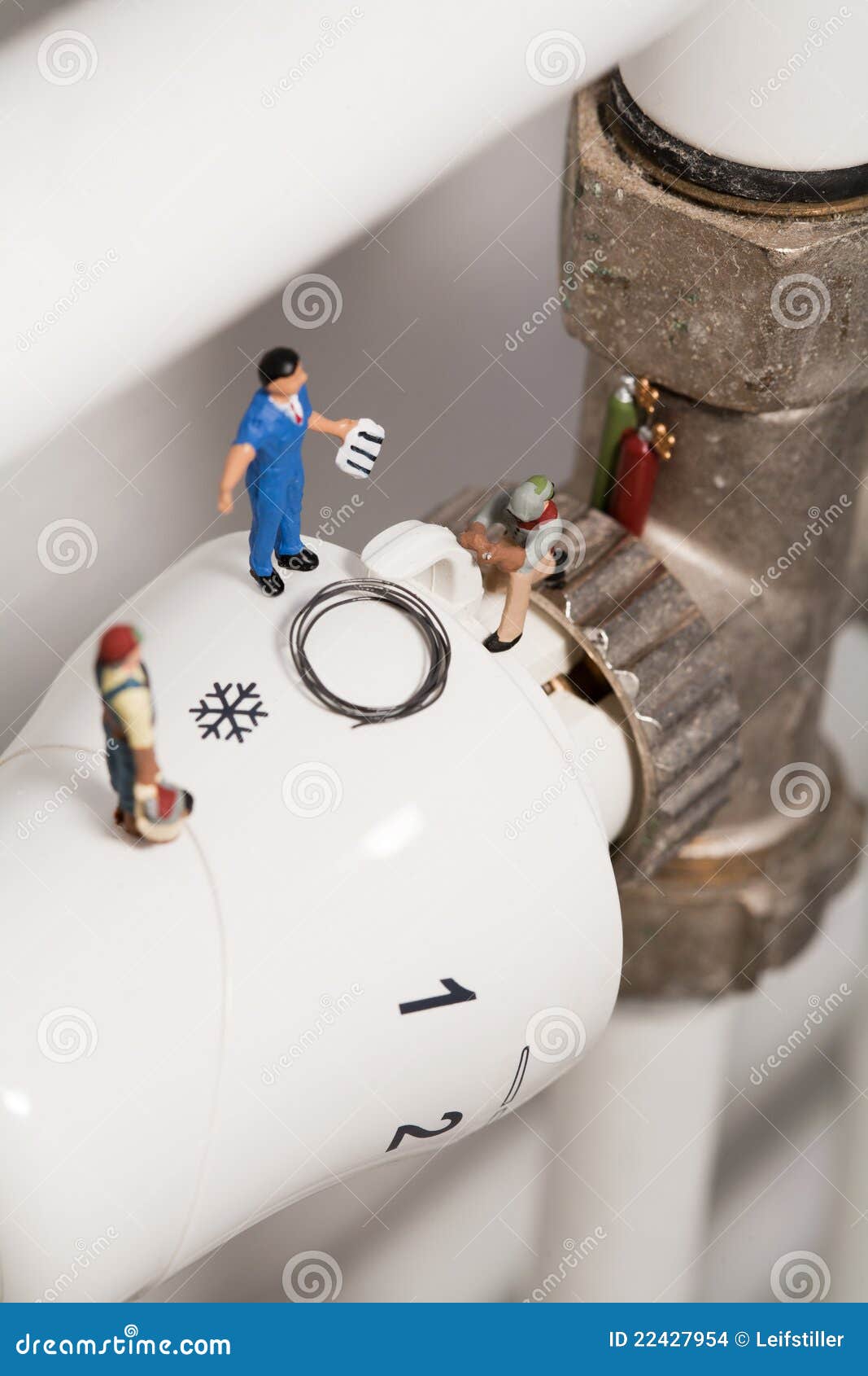 Miniature Plumbers Repairing a Thermostat. Stock Photo - Image of ...