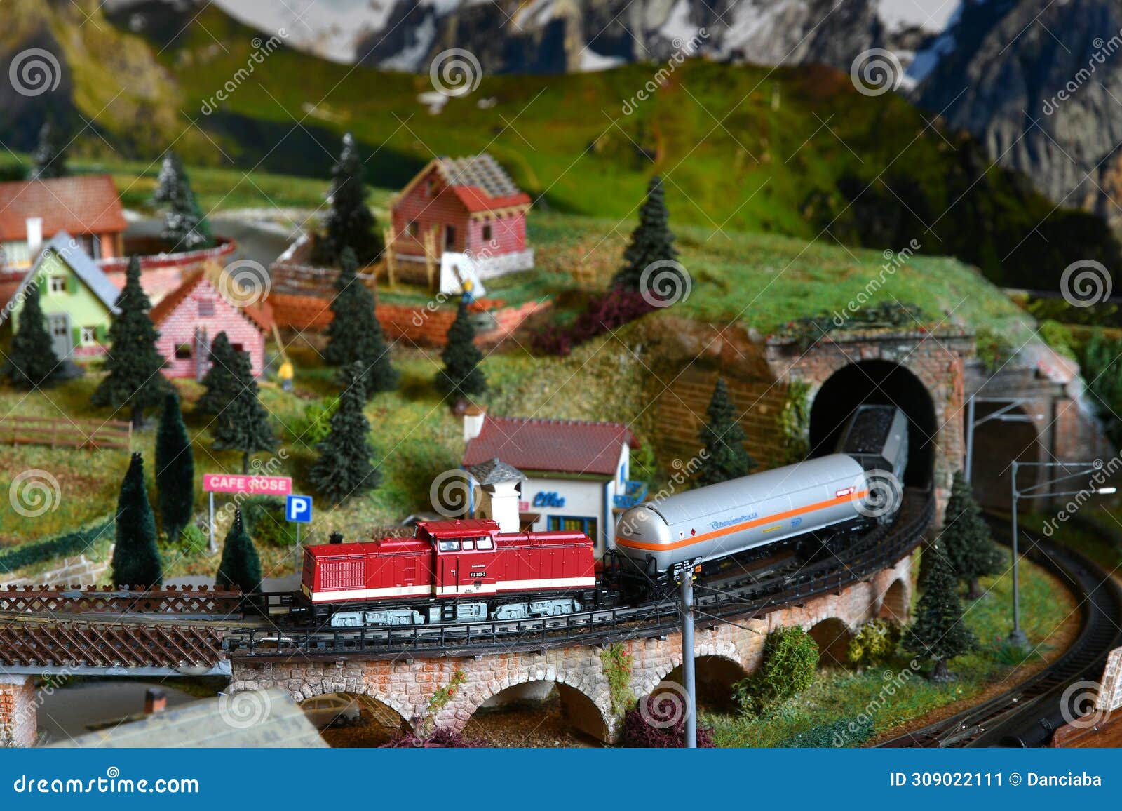 Miniature Railway Model with Model Freight Train that Exit from a ...