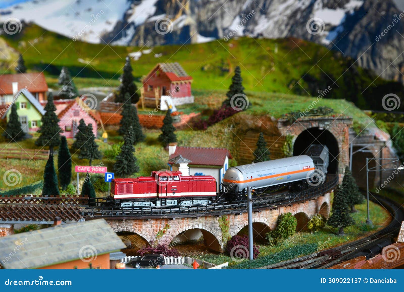 Miniature Railway Model with Model Freight Train that Exit from a ...