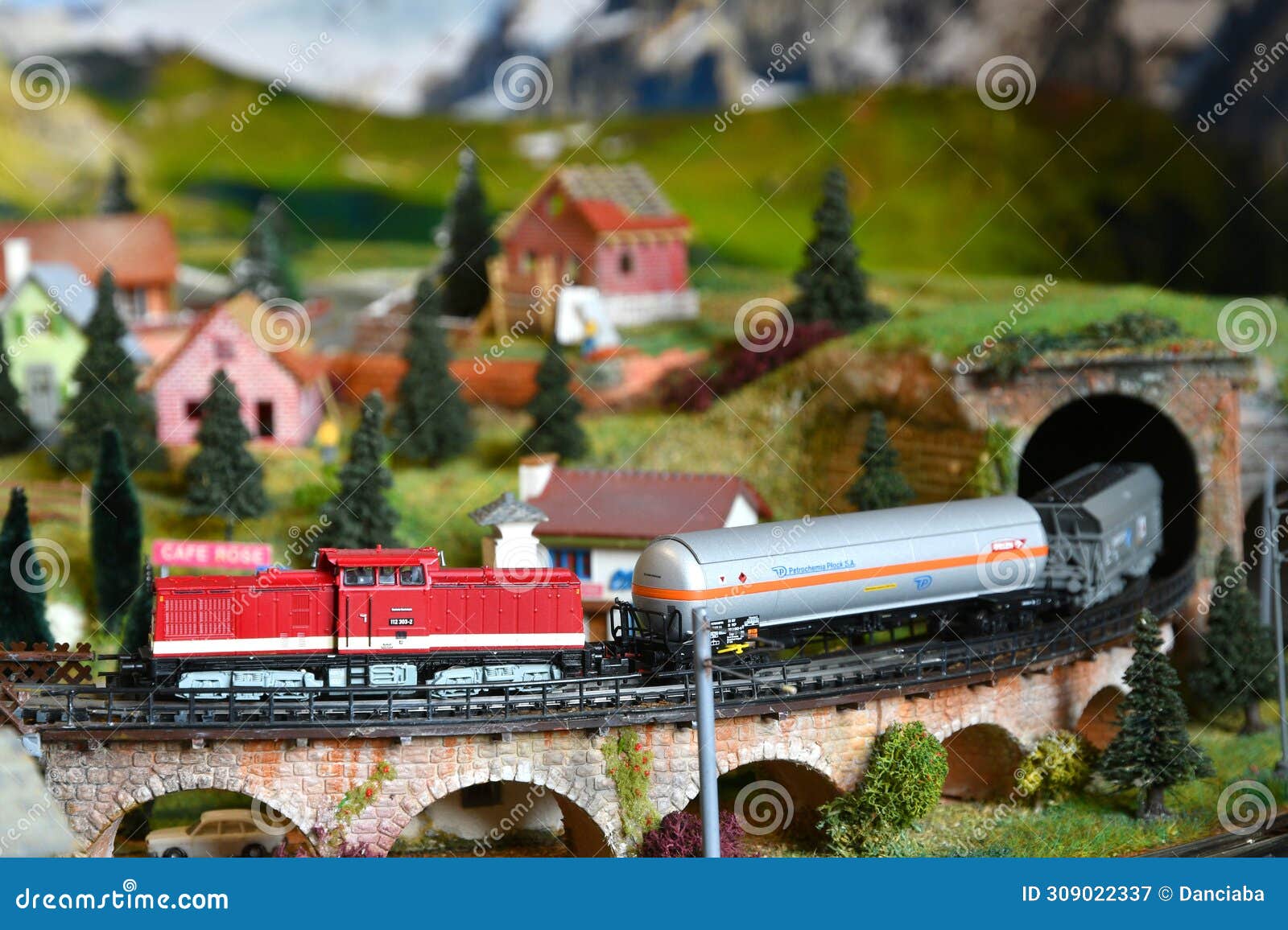 Miniature Railway Model with Model Freight Train that Exit from a ...