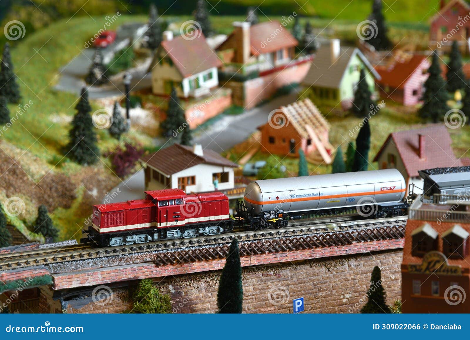 Miniature Railway Model with Model Freight Train on a Mountains ...