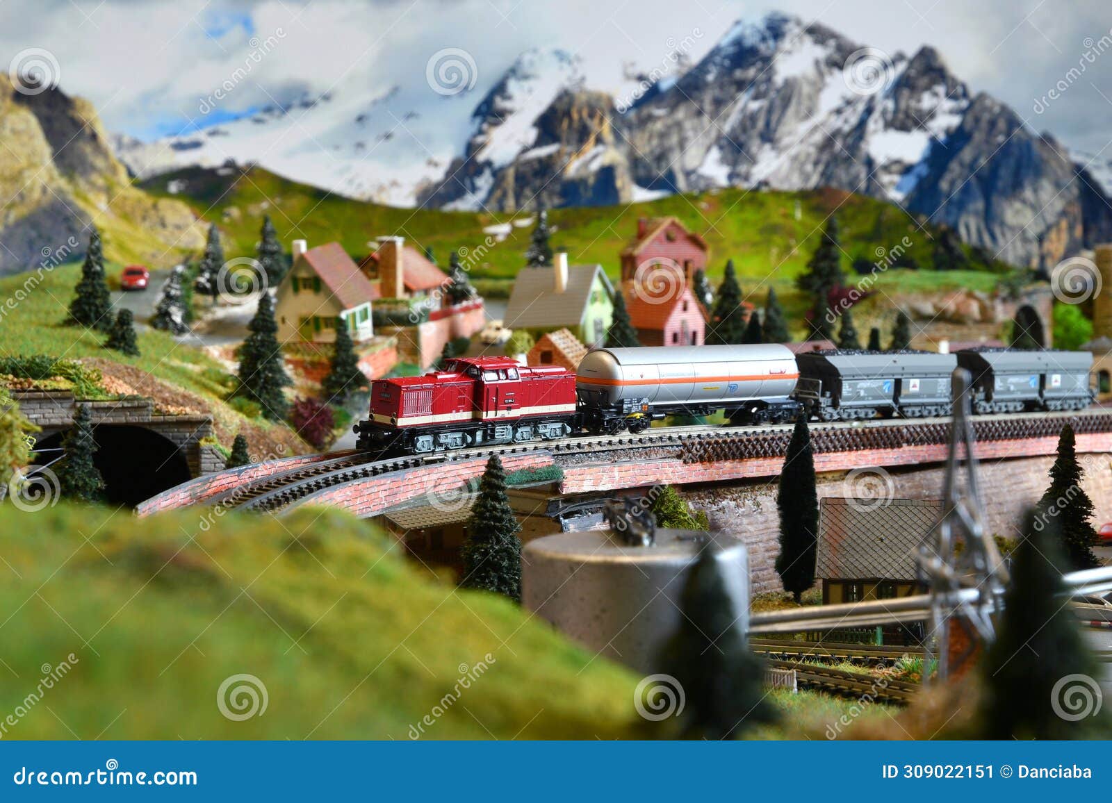 Miniature Railway Model with Model Freight Train on a Mountains ...