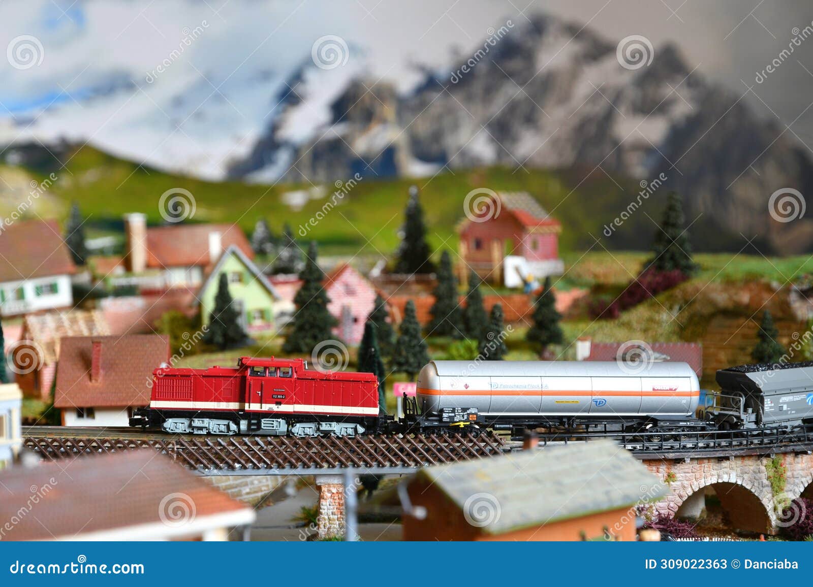 Miniature Railway Model with Model Freight Train on a Mountains ...