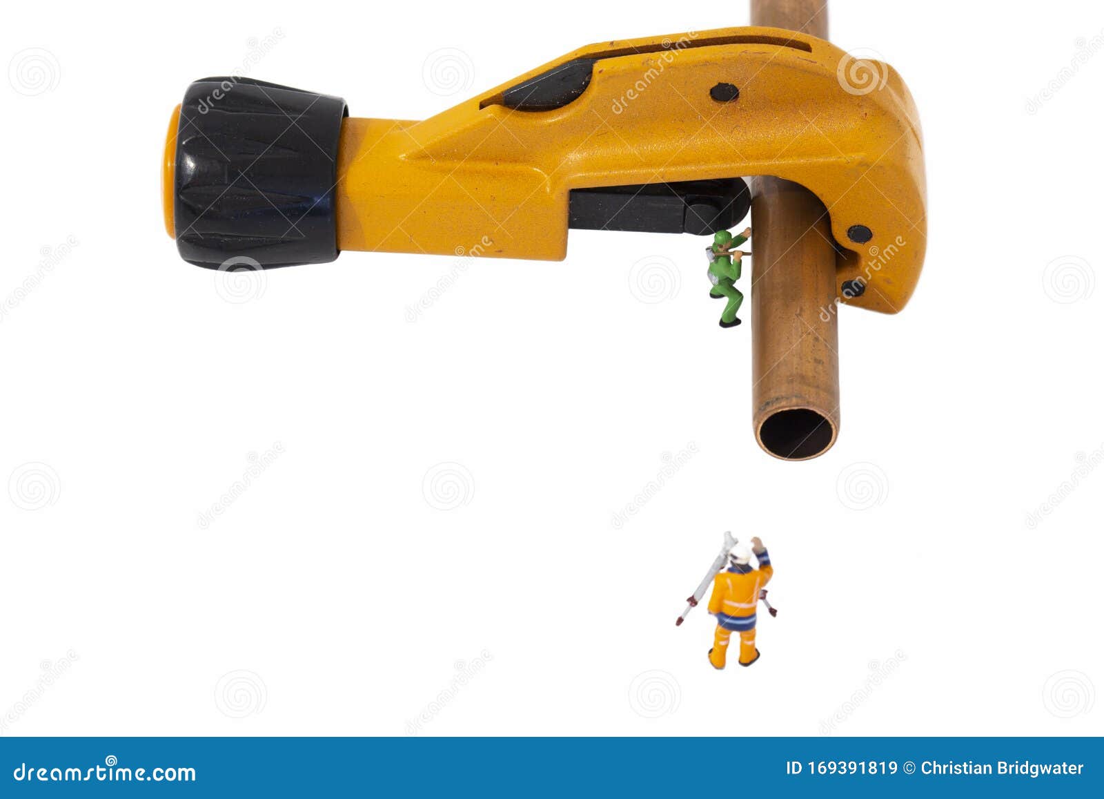 Miniature Scale Model Construction Workers with a Copper Pipe and a ...