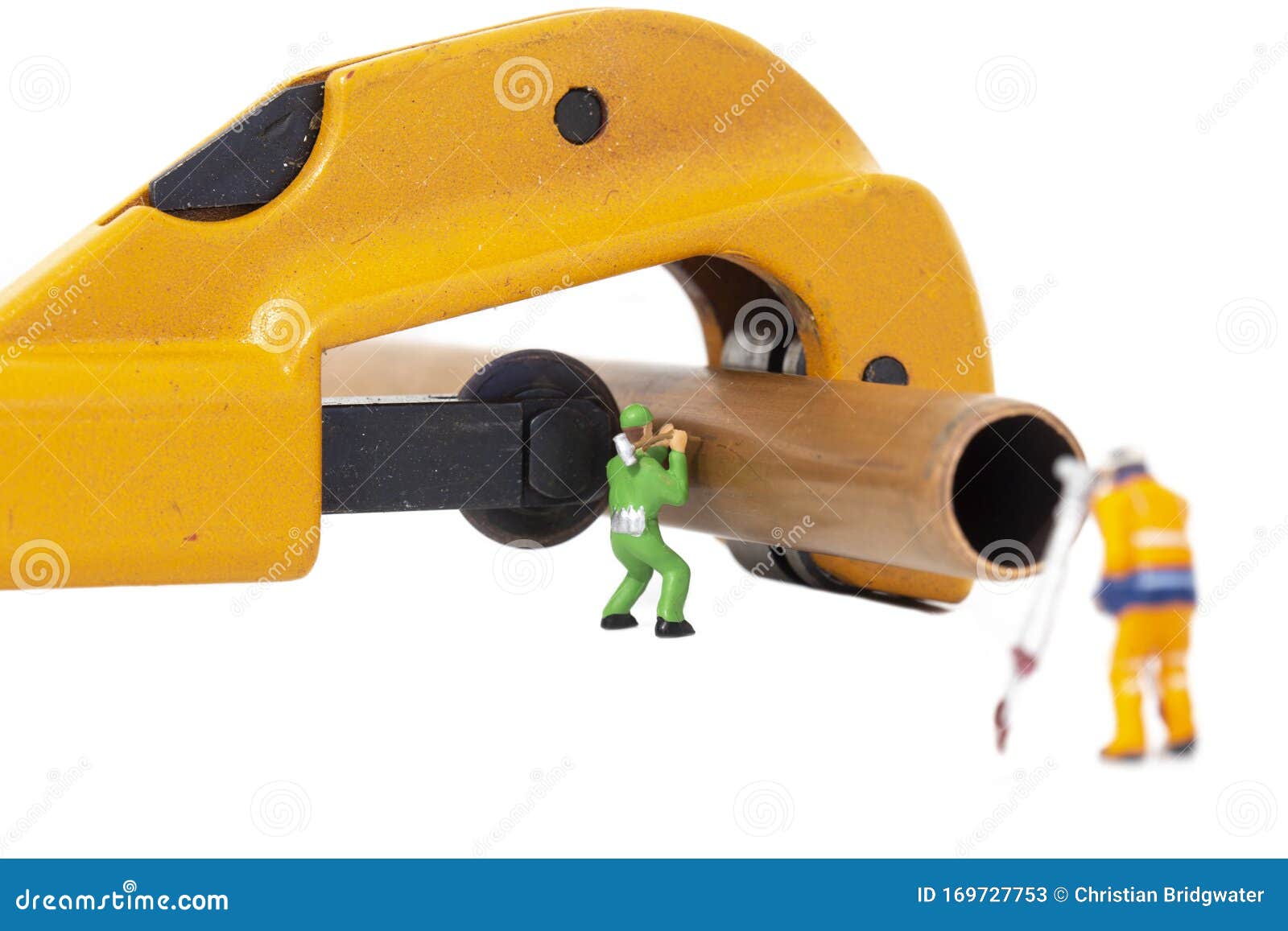 Miniature Scale Model Construction Workers with a Copper Pipe and a ...