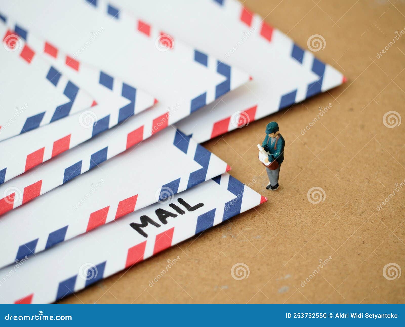 Miniature Scene of Postman with Envelope. Mail Business Conceptual ...