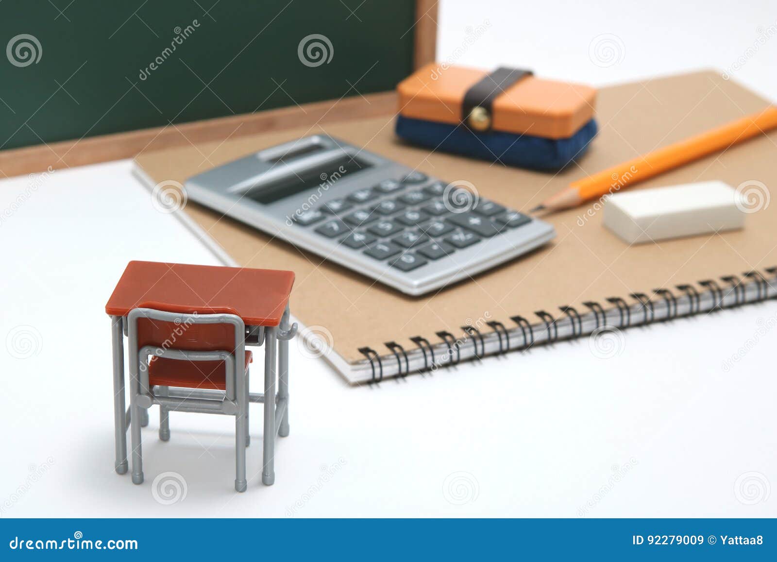 Miniature School Desk, Chalkboard and Calculator on White Background ...