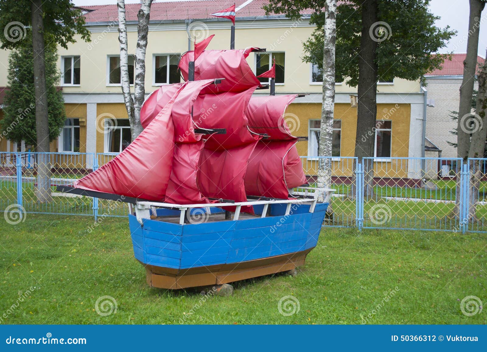 Miniature of Ship with Red Flags Editorial Photography - Image of flags ...
