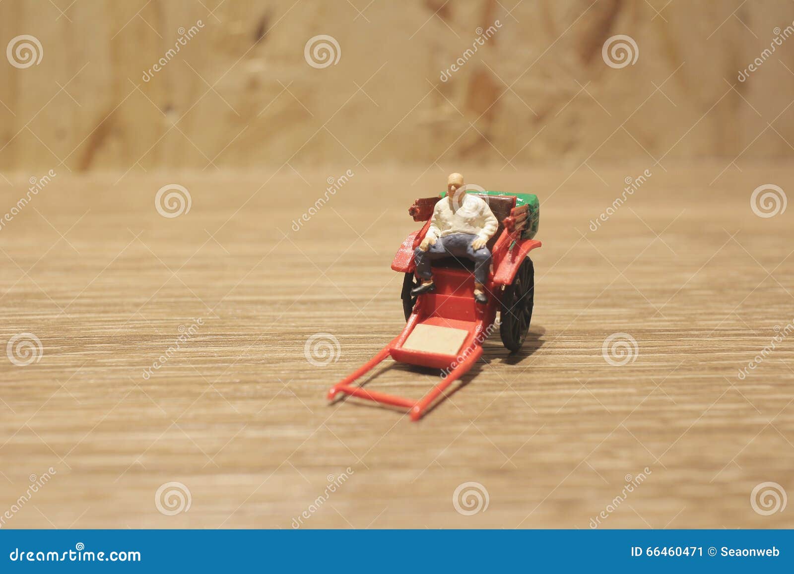 Miniature Statue and Red Vintage Oriental Rickshaw Cab Stock Image ...