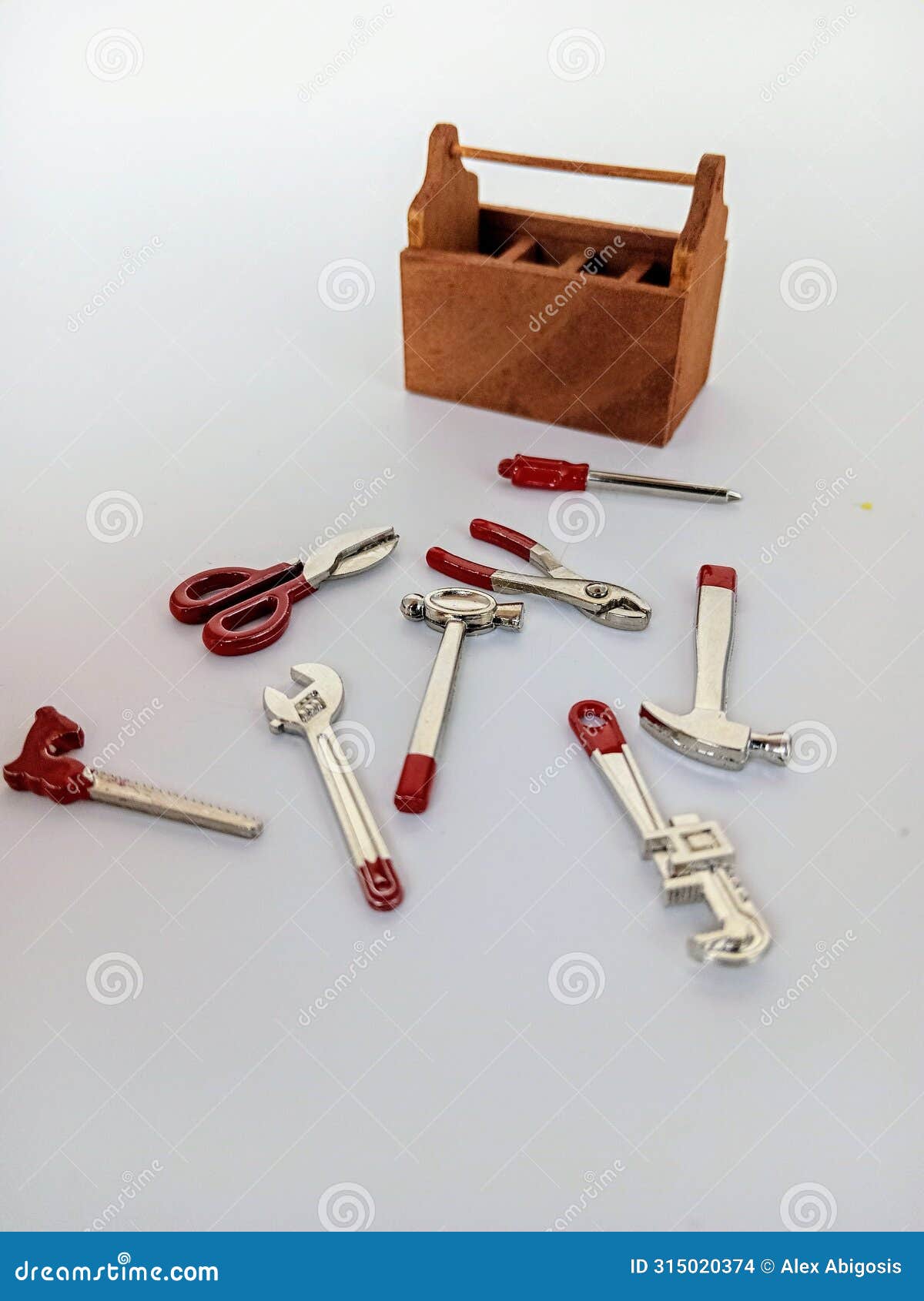 Miniature Tools and Tool Box on a White Background Stock Photo - Image ...