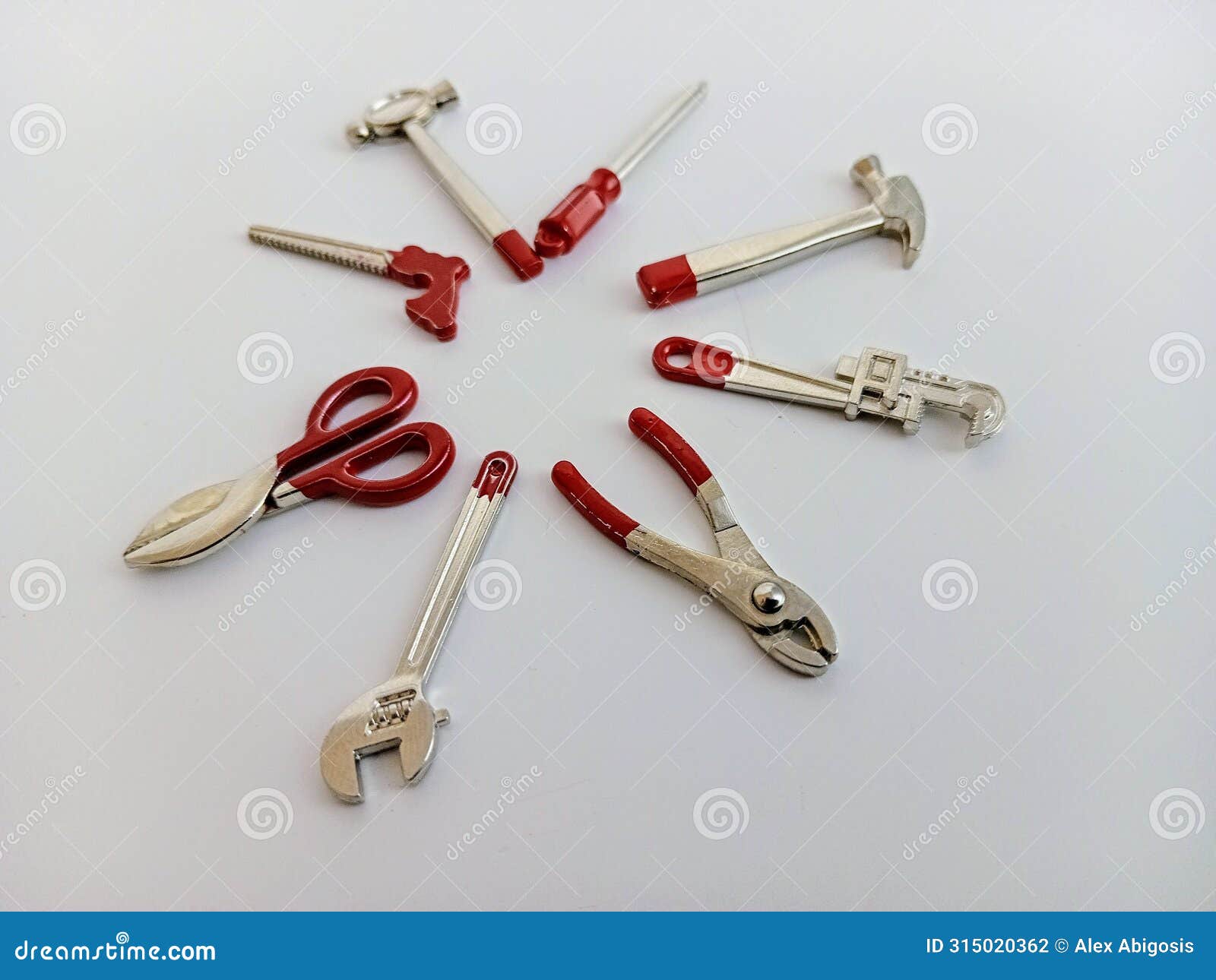 Miniature Tools on a White Background Stock Photo - Image of collection ...