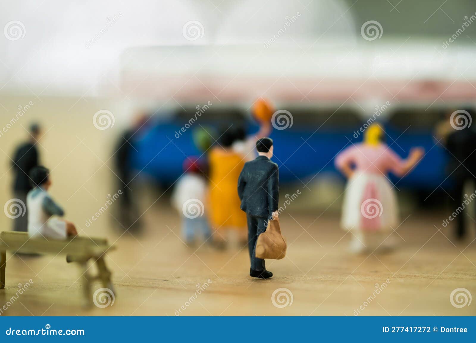 Miniature Toy Figurines of a Group Passengers Waiting at a Platform ...