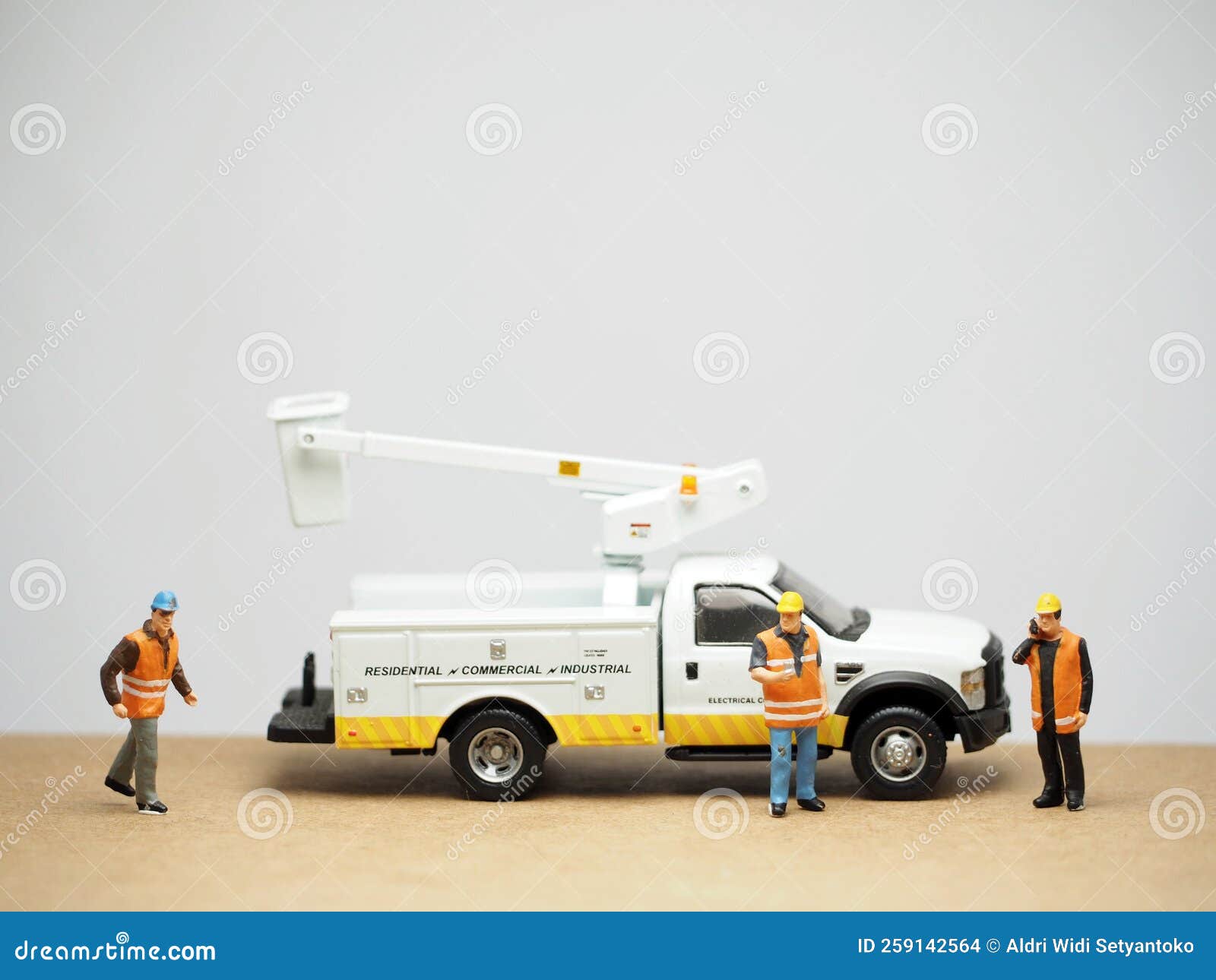 Miniature Toy at Table with White Background. Electrical Service ...