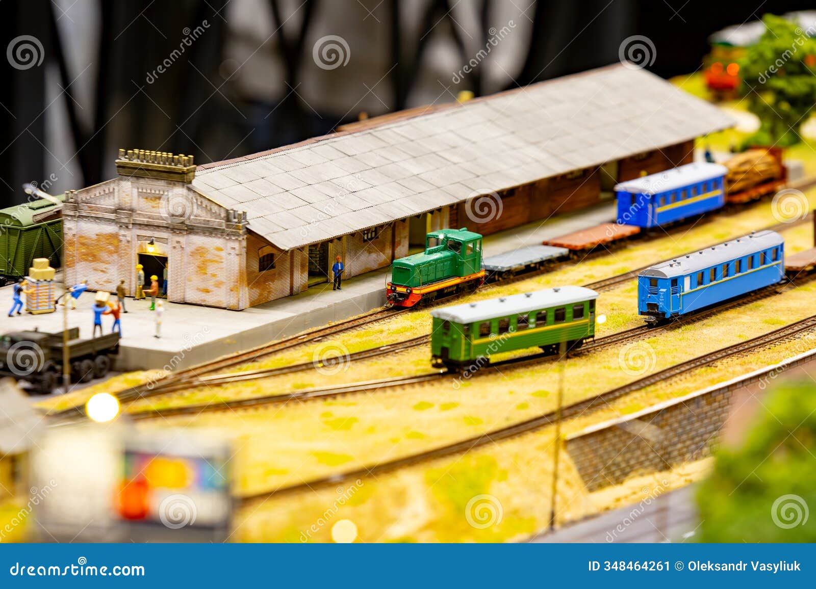 Miniature Train Station Model with Workers Loading Cargo and Passengers ...