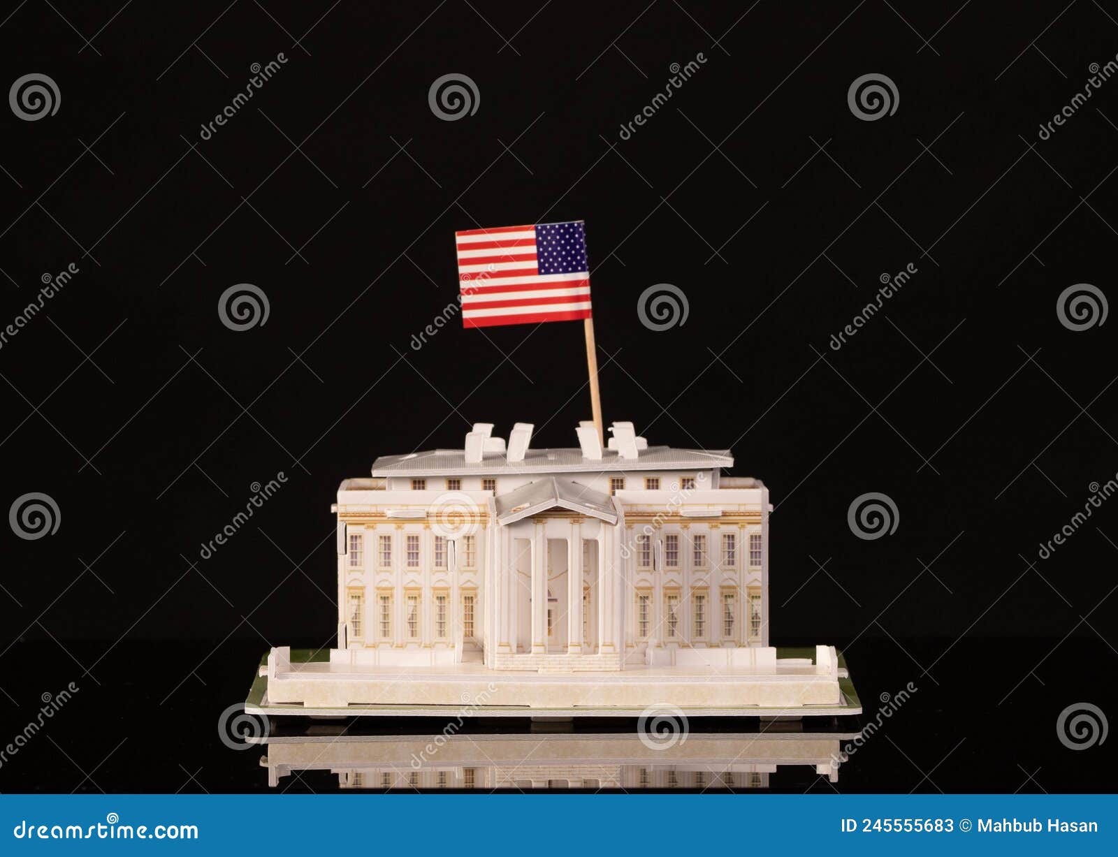 Miniature White House with American Flag on Black Background Stock ...