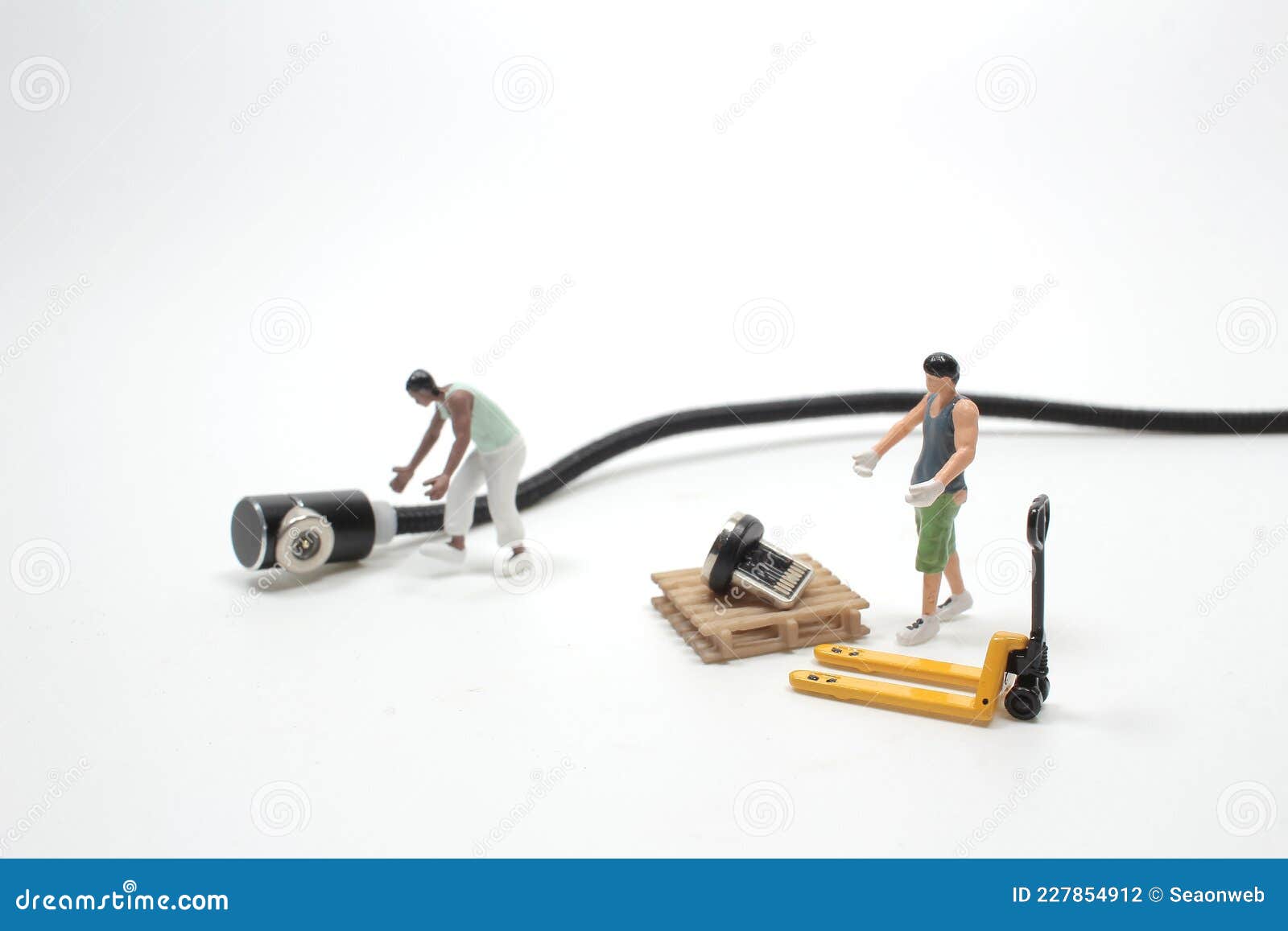 A Miniature Worker Moving USB Cable on White Background, Technology ...