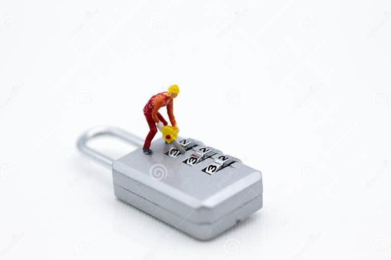 Miniature Worker and Security Key Using As Background Security S Stock ...