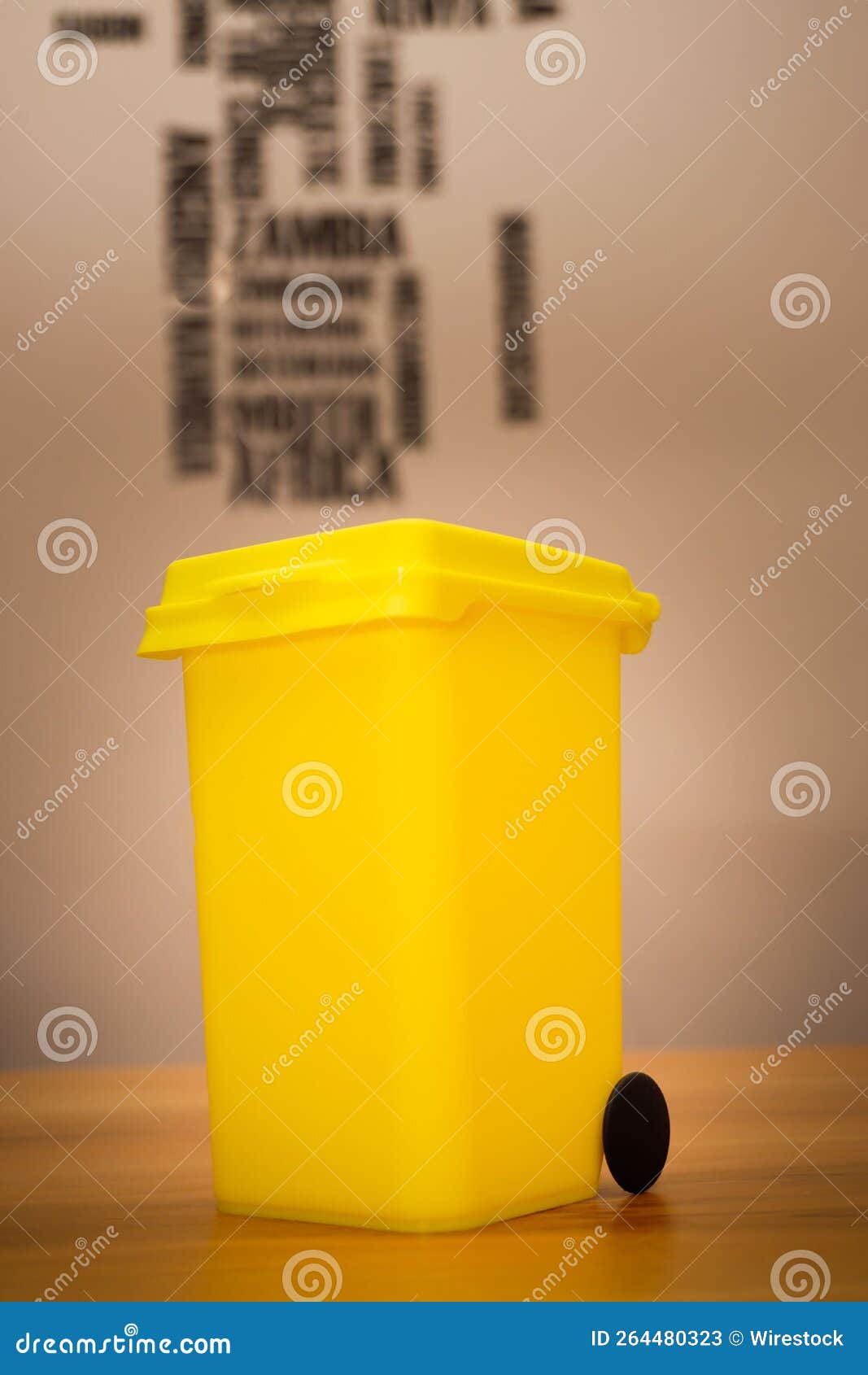 Miniature Yellow Bin Representing Electronic Waste Disposal Stock Image ...