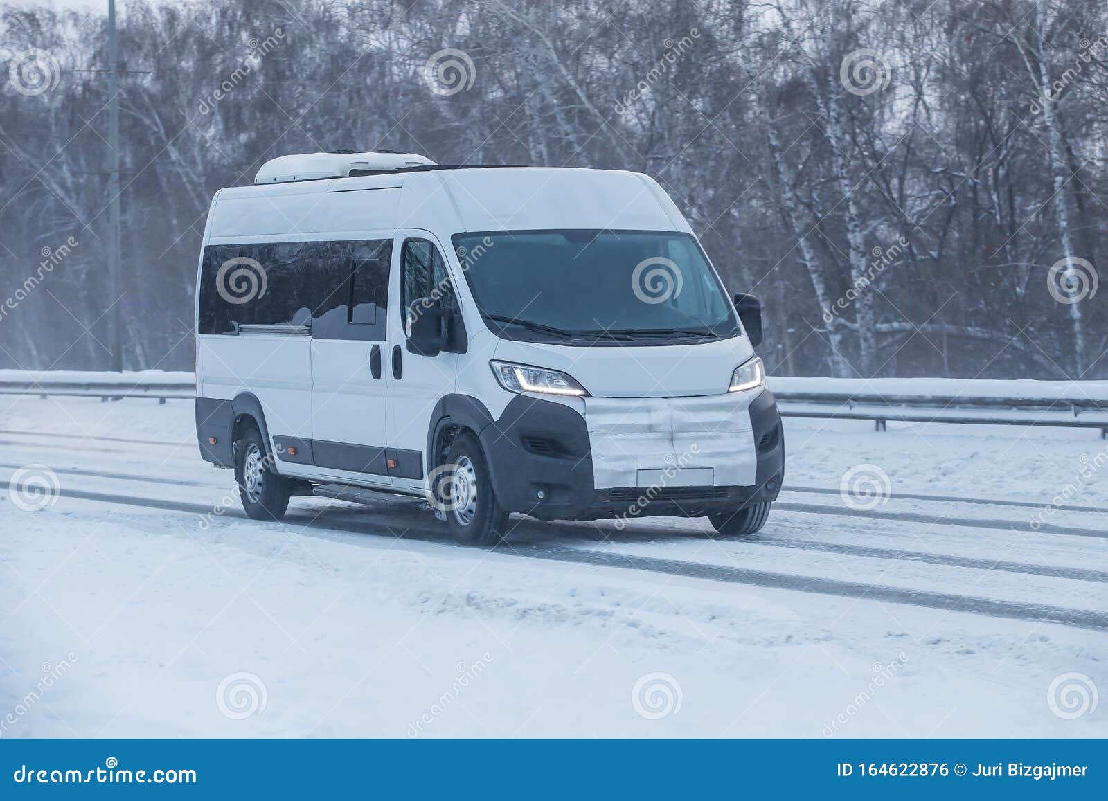 Minibus Moves in the Winter on a Highway Stock Photo - Image of cold ...