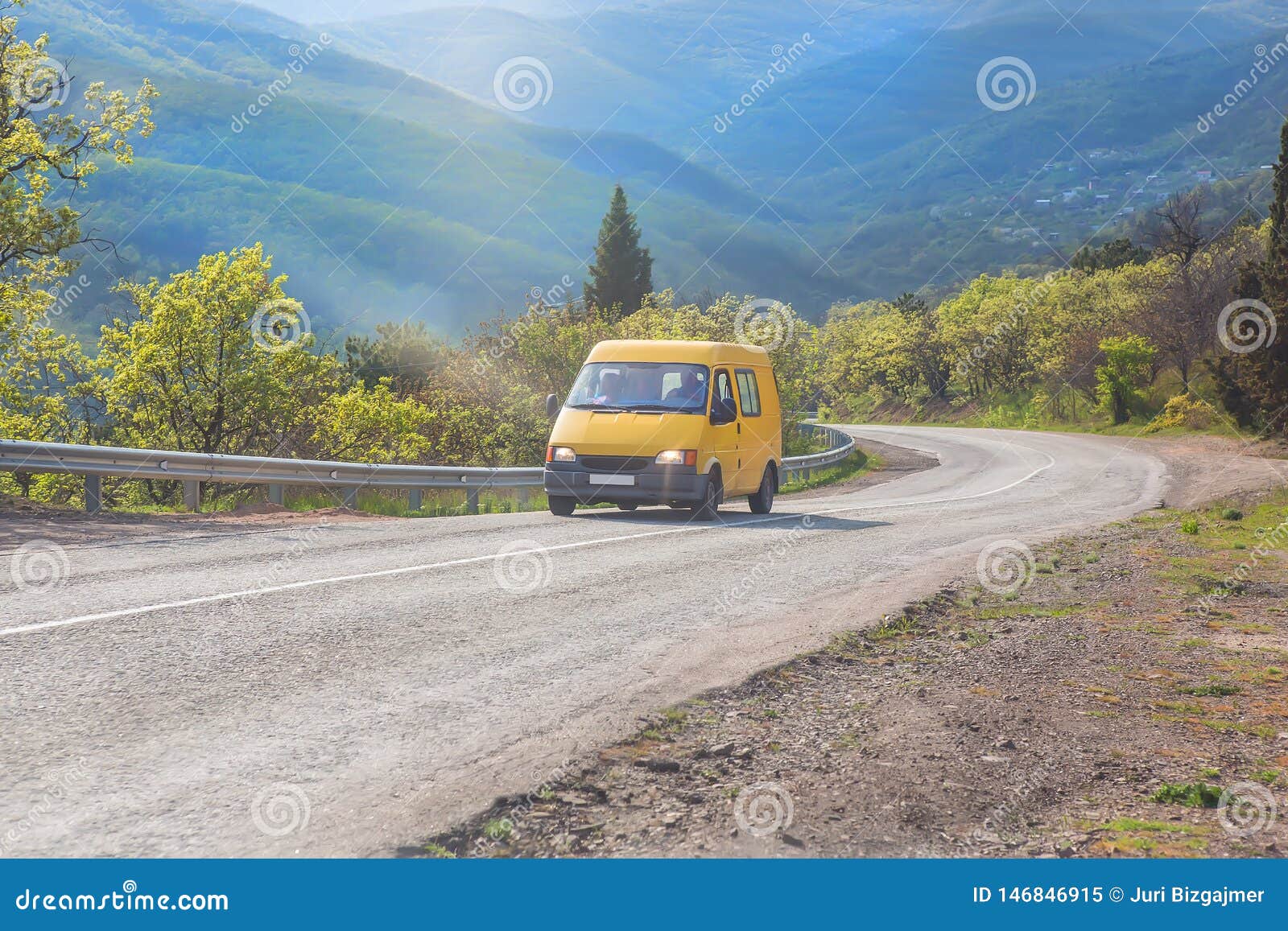 Minibus is Moving Along the Road in the Highlands Stock Image - Image ...