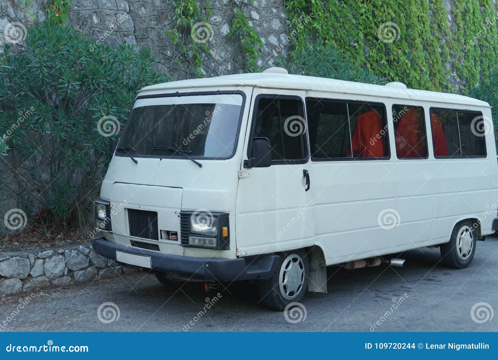 Minibus is Parked on the Edge of the Road. Front View Stock Photo ...