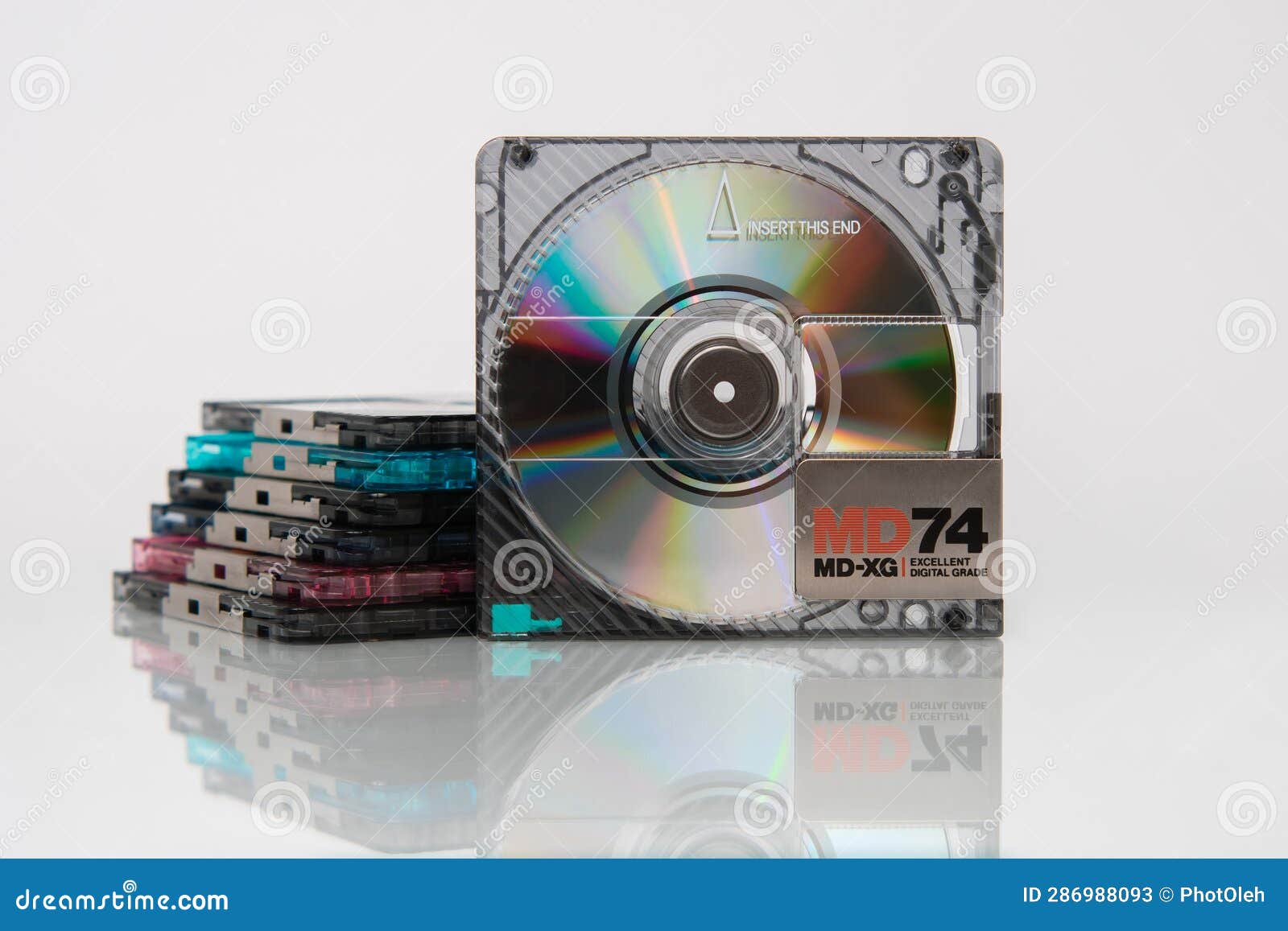 Minidisic Stands Vertically in Front of a Stack of Minidiscs Stock ...