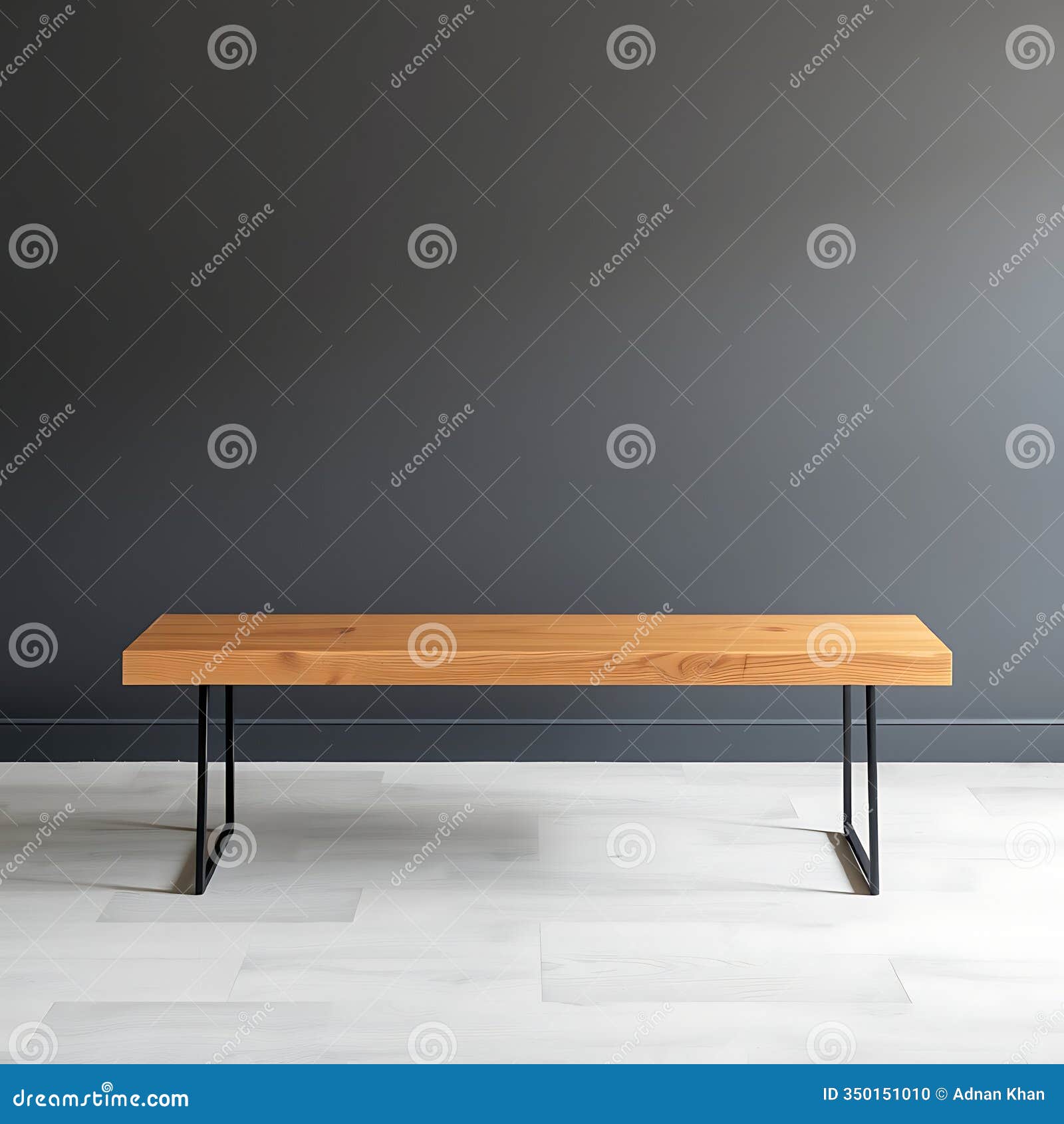 A Minimal Dining Bench with a Solid Oak Seat and Thin Metal Legs Stock ...