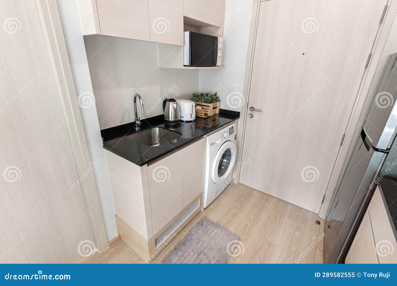 Minimal Kitchen Corner with Washing Machine Stock Image - Image of ...