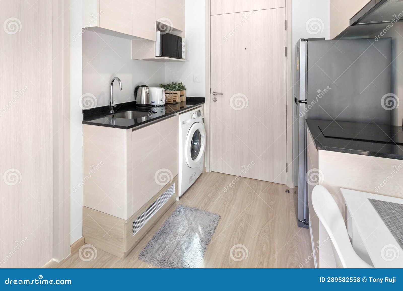 Minimal Kitchen Corner with Washing Machine Stock Photo - Image of ...