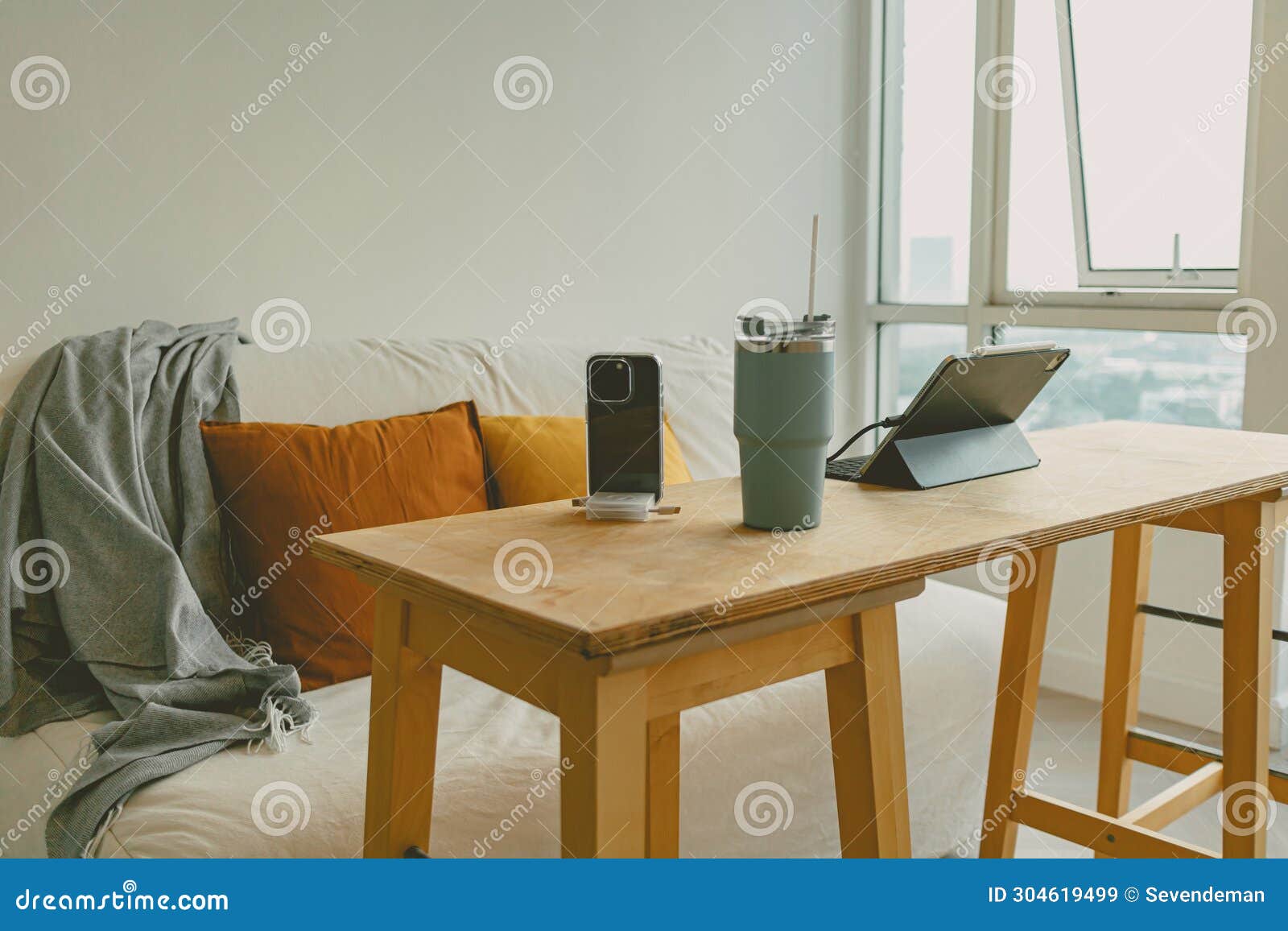 Minimal and Loft Living Room Design with Iced-coffee and Computer in ...