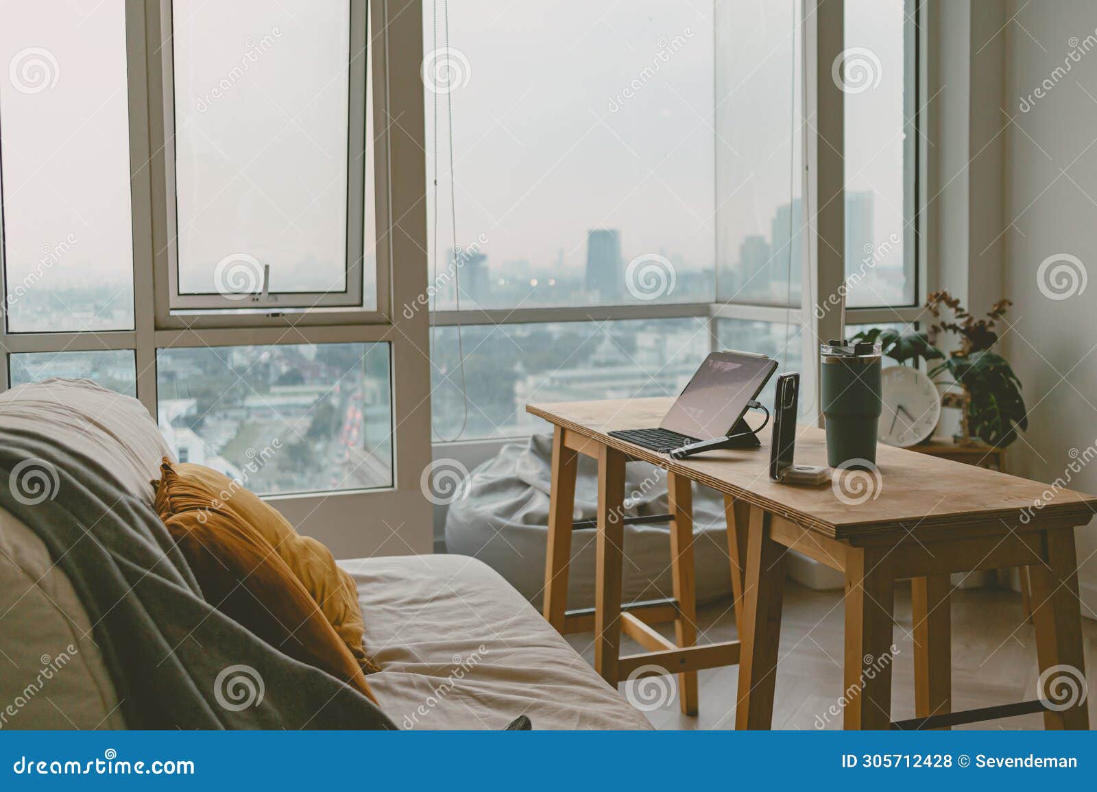 Minimal and Loft Living Room Design with Iced-coffee and Computer in ...