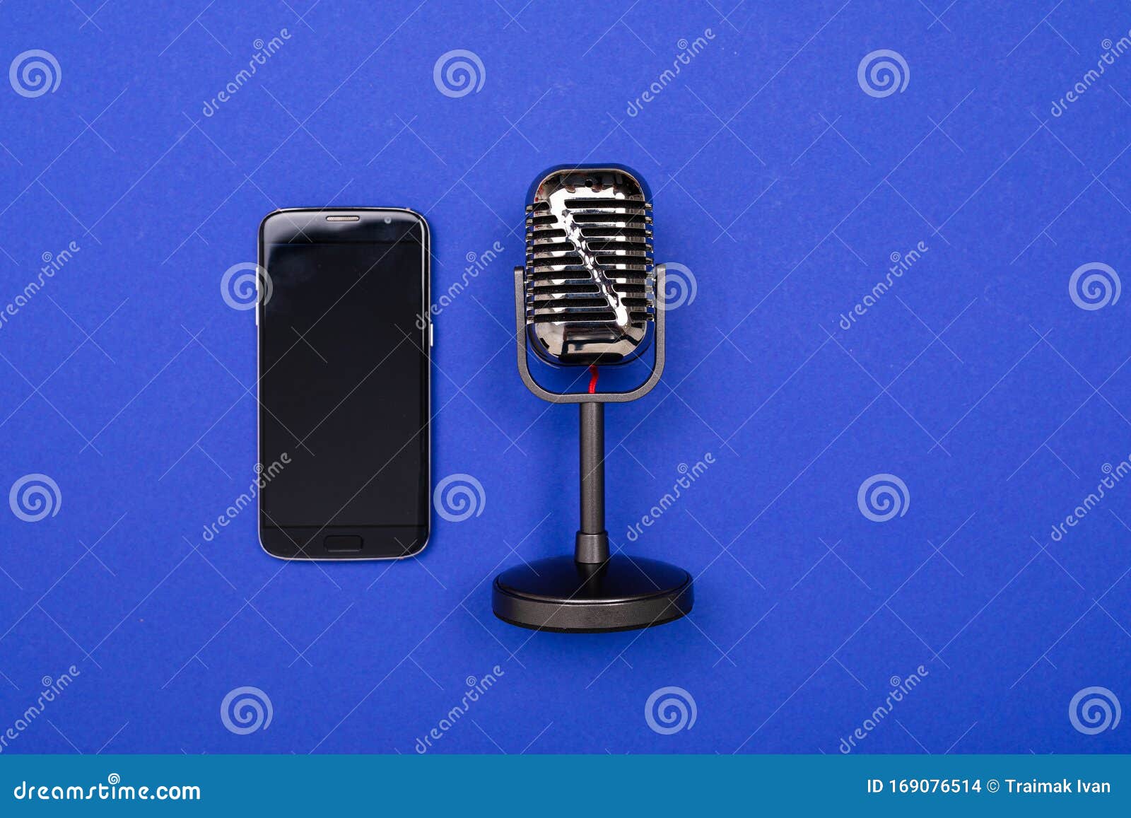Minimalism Concept. Phone and Microphone on a Bright Blue Background ...