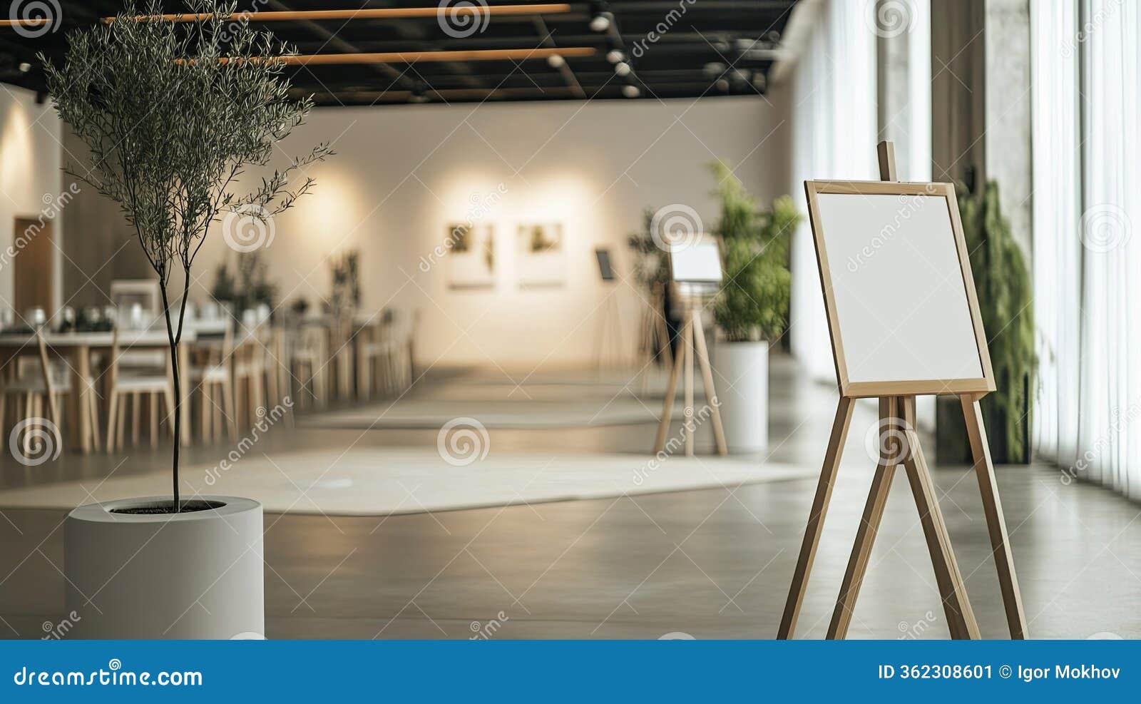A Minimalist Corporate Event Setup Featuring Clean Signage and Neutral ...