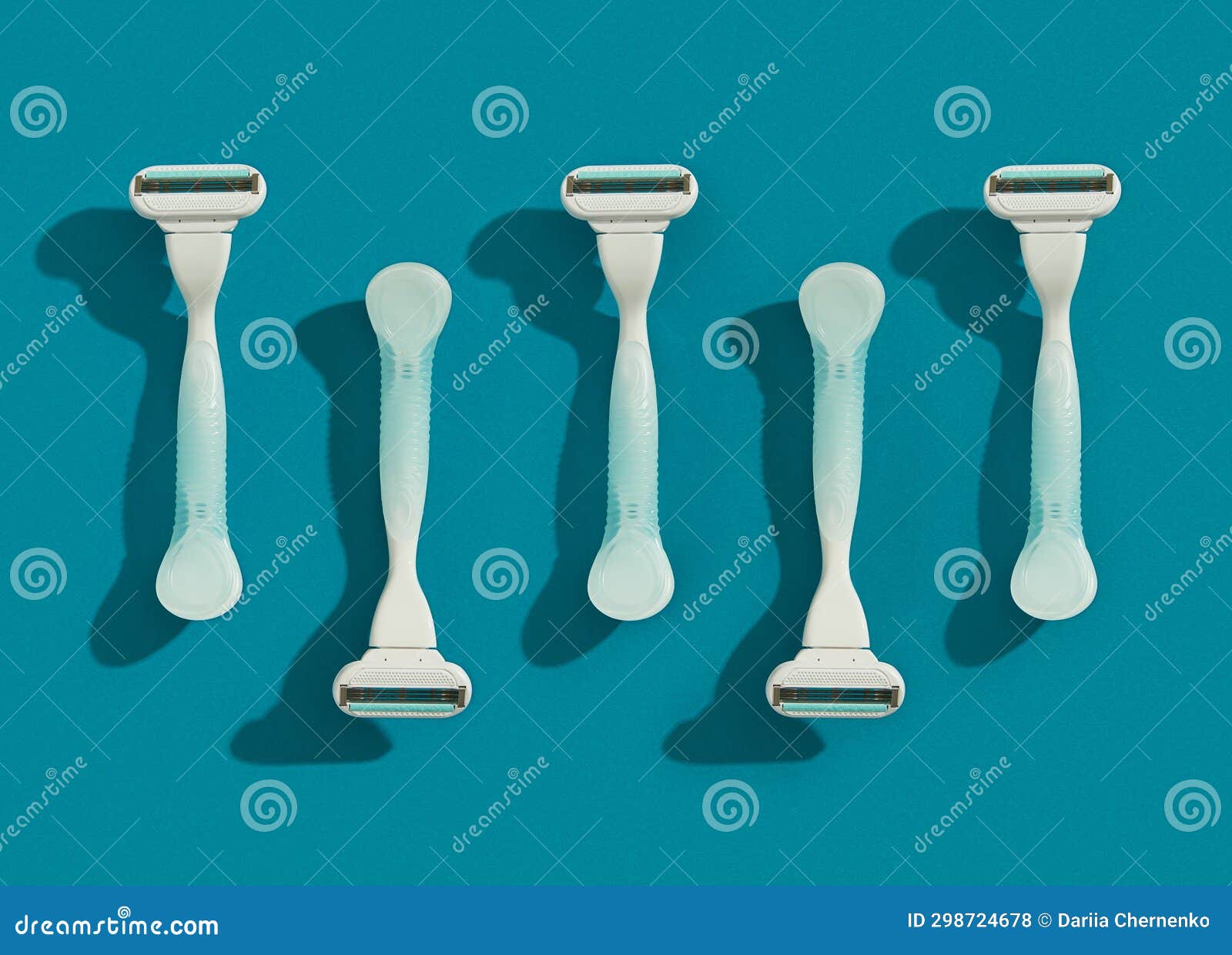 Minimalist Elegance: Razor in Sharp Relief Against a Bold Blue Canvas ...