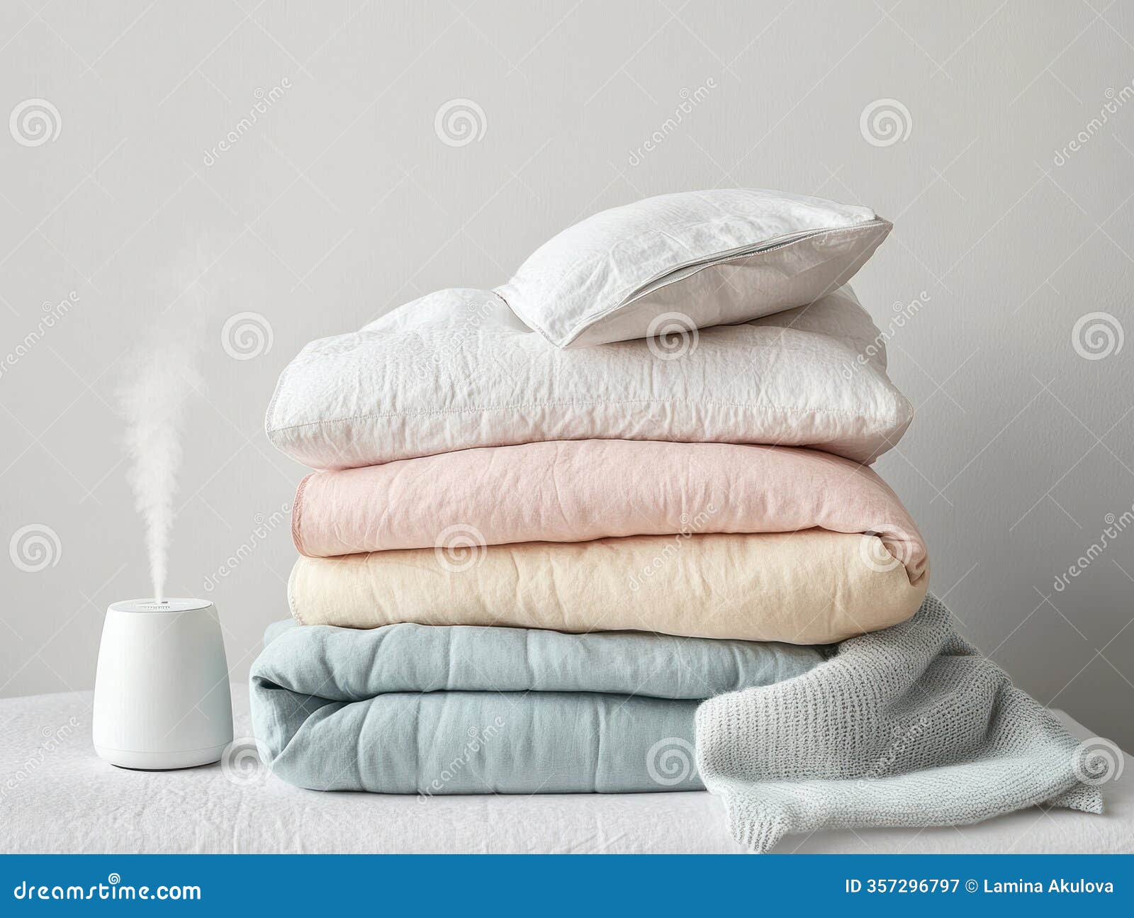 Minimalist Interior Design with Neatly Folded Textiles and Aromatherapy ...