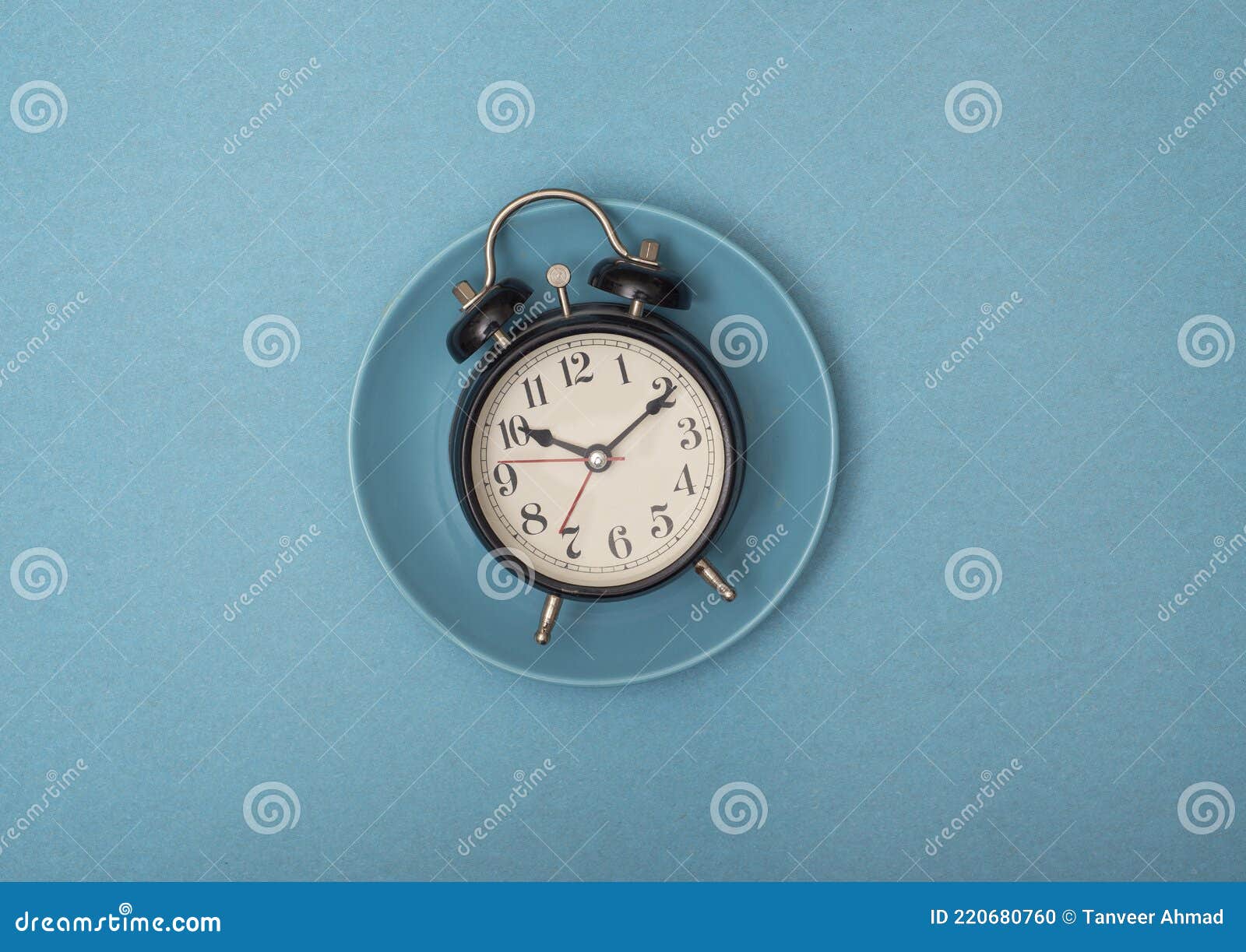 Minimalist Time Management Concept with Clock in Plate Blue Background ...