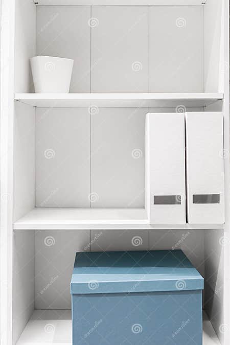 A Minimalist Wardrobe, Half-empty Shelves in a White Wardrobe. Stock ...