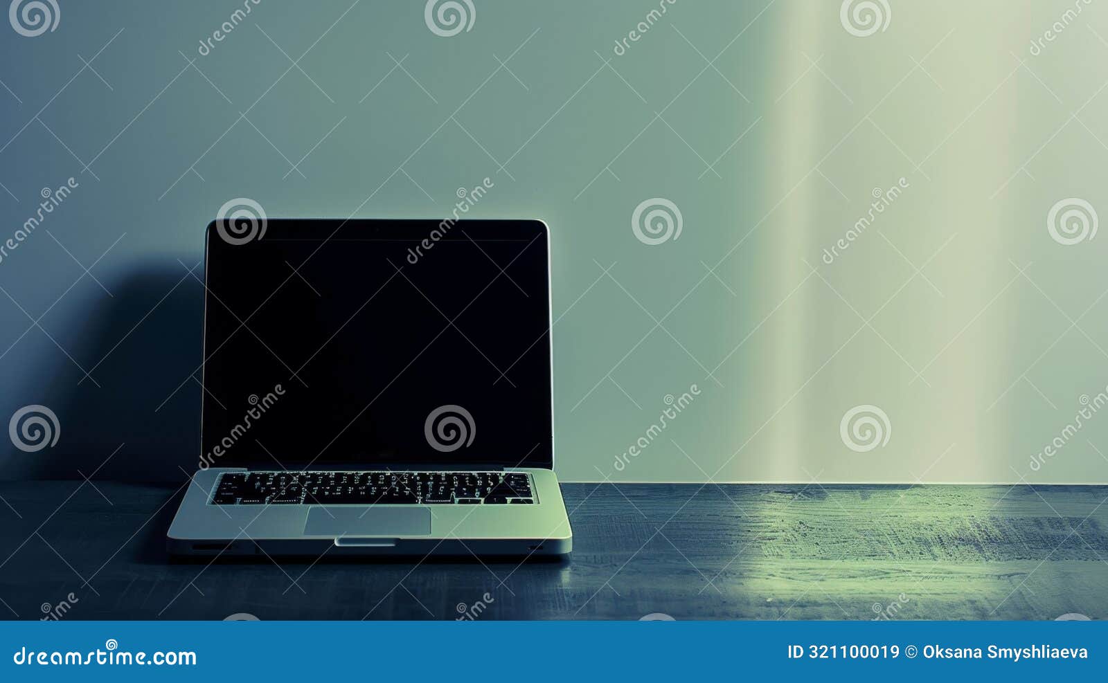 Minimalist Workspace with Laptop on Desk in Dim Light Stock Image ...