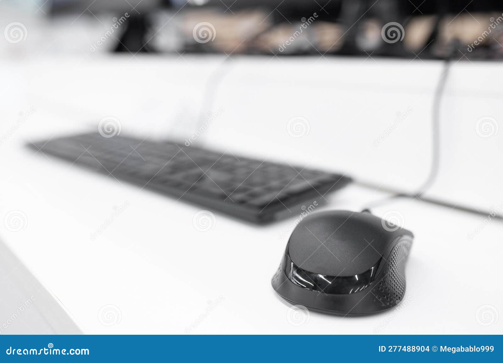 Minimalistic Computer Workplace with Computer Mouse in Focus and ...