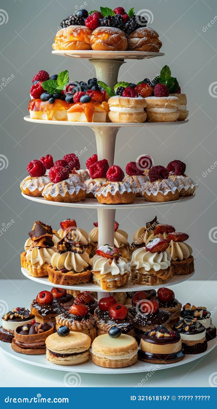Minimalistic Dessert Tower with Assorted Mini Pastries Elegantly ...