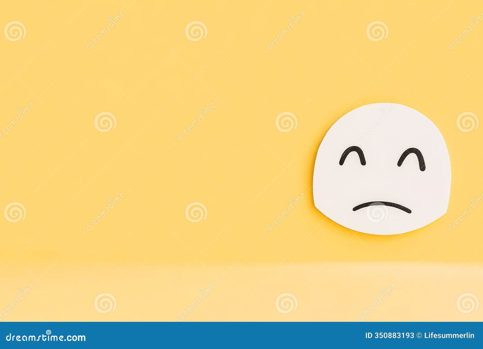 Minimalistic Sad Face Emoji on Yellow Shelf with Matching Background ...