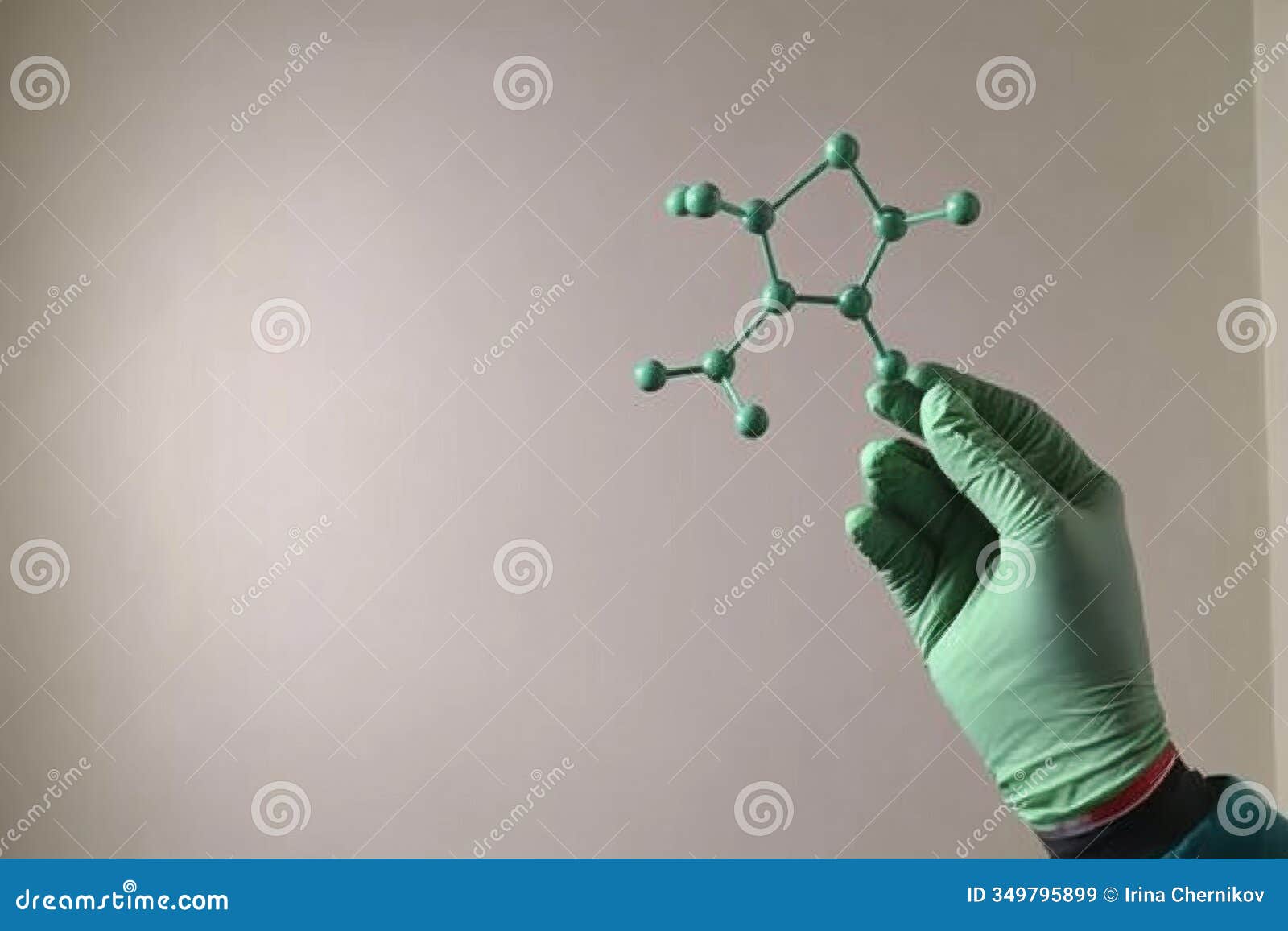 Minimalistic Science Concept Featuring a Molecule Model and Gloved Hand ...