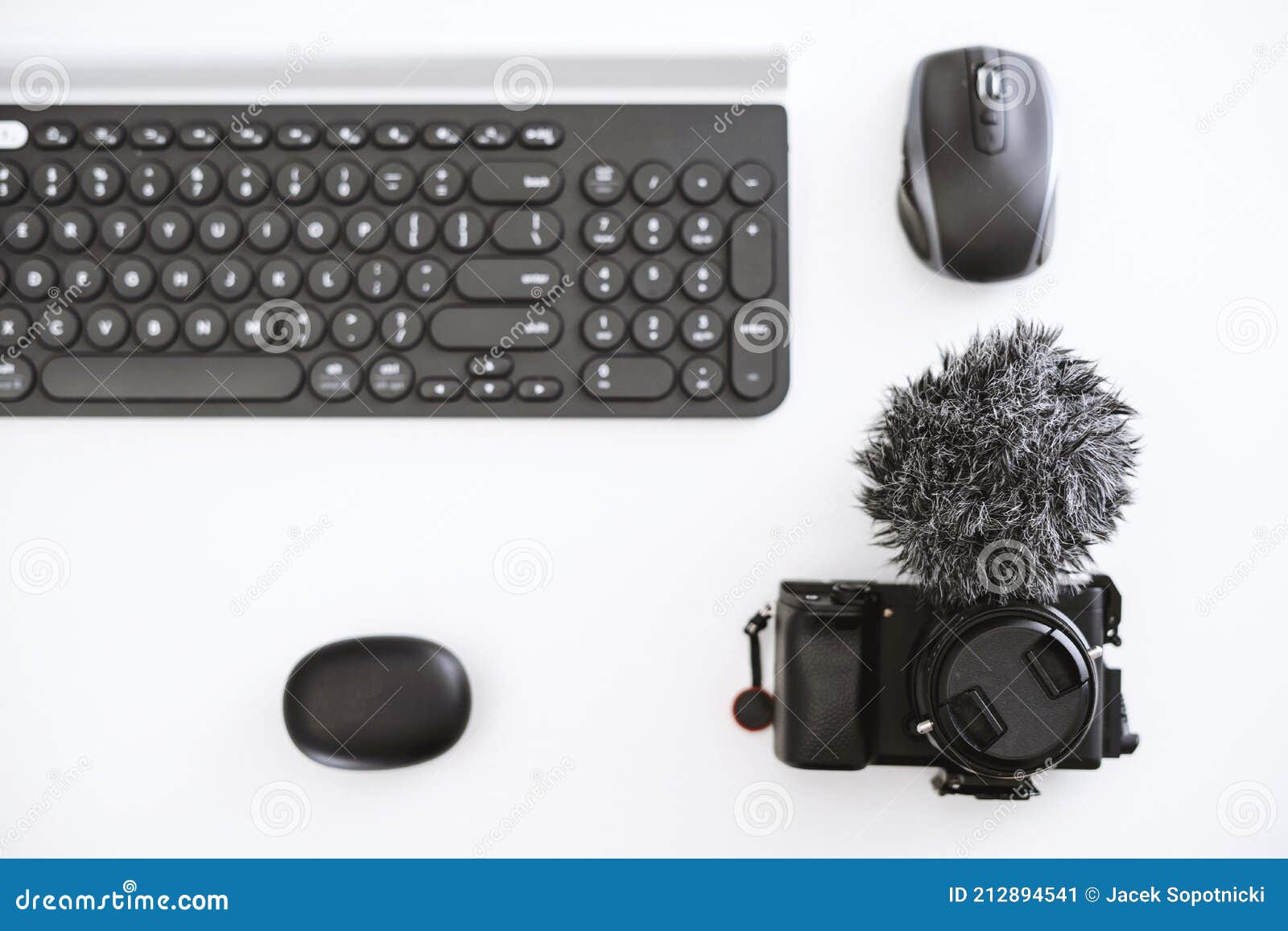 A Minimalistic Set of Vlogger: Camera with Mic, Mouse, Keyboard, and ...