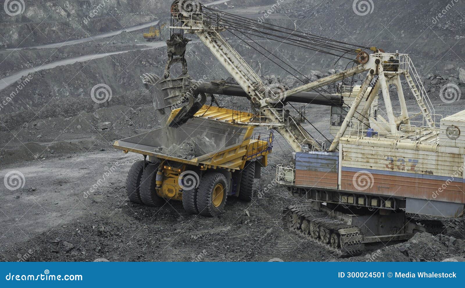 Mining Excavator Scooping Up Ore in a Quarry. Close Up of Limestone ...