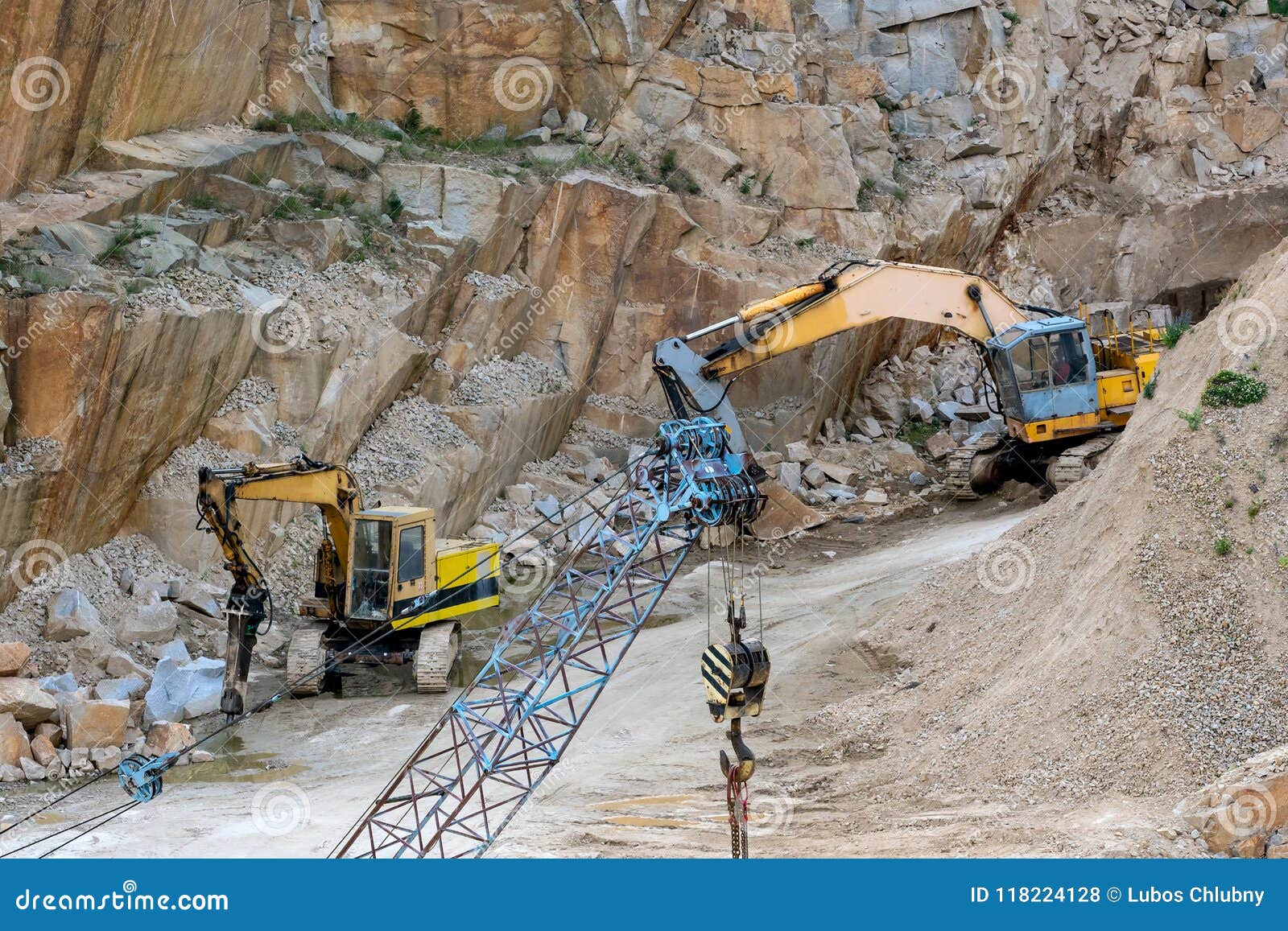 Mining in the Granite Quarry. Working Mining Machine - Old Crane Stock ...