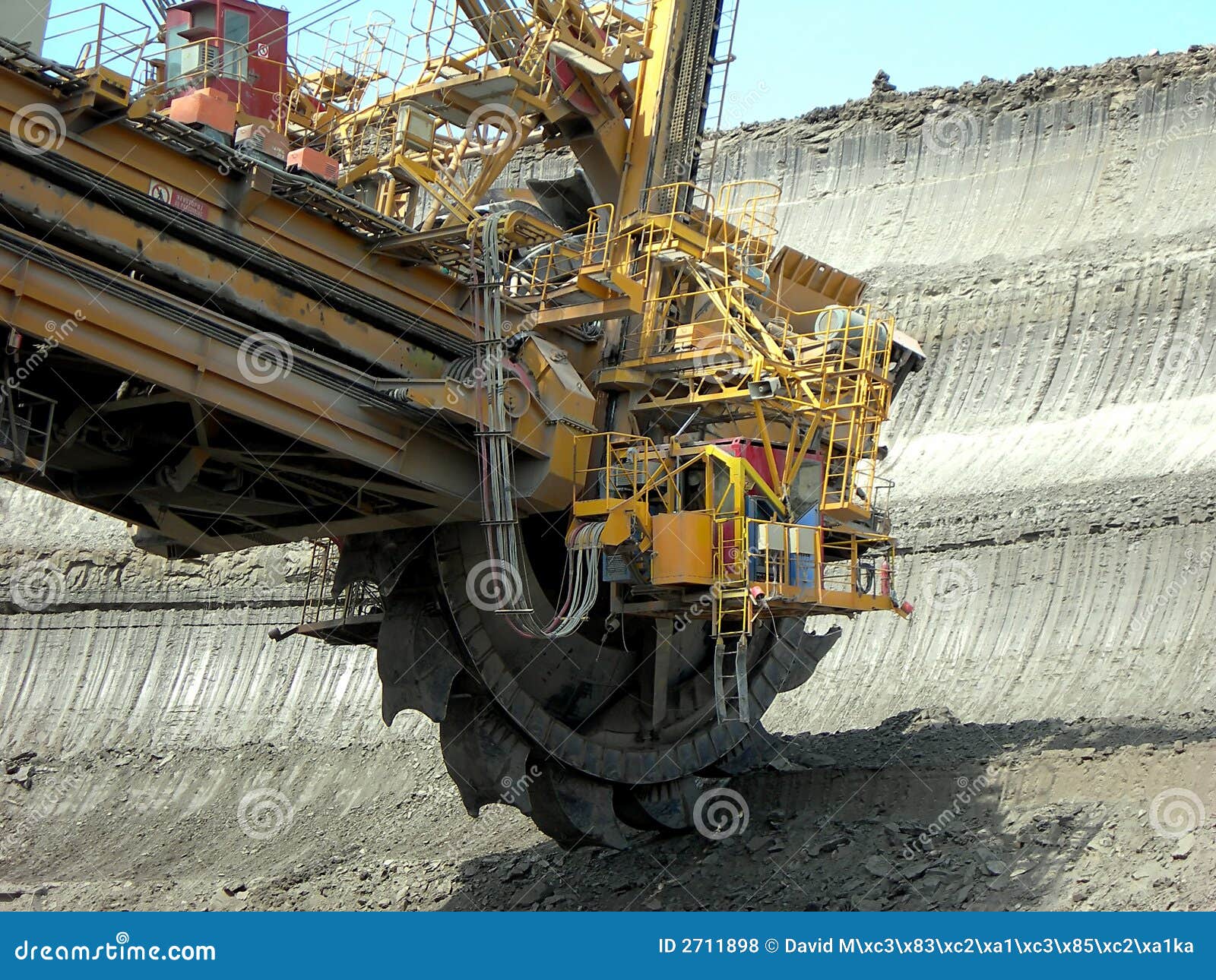Mining machine in action stock photo. Image of development - 2711898