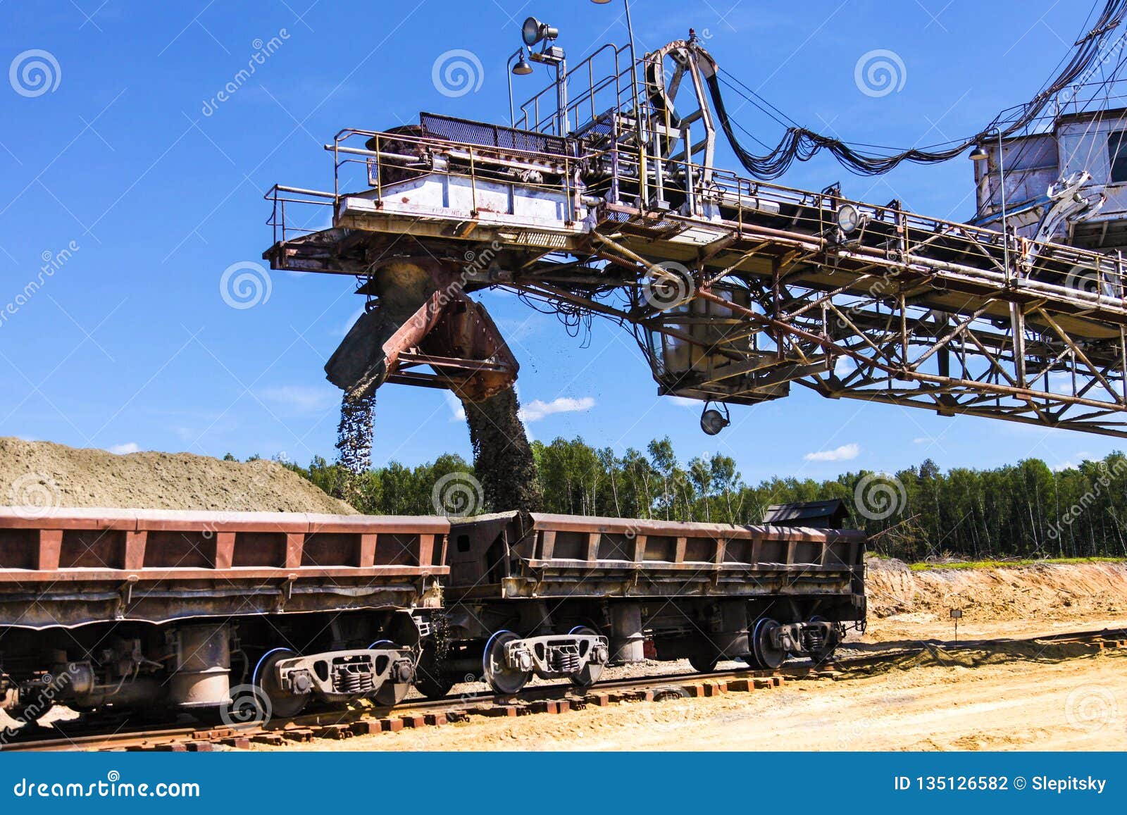 Mining Machine Loadind Sand in Train Cars Stock Photo - Image of ...