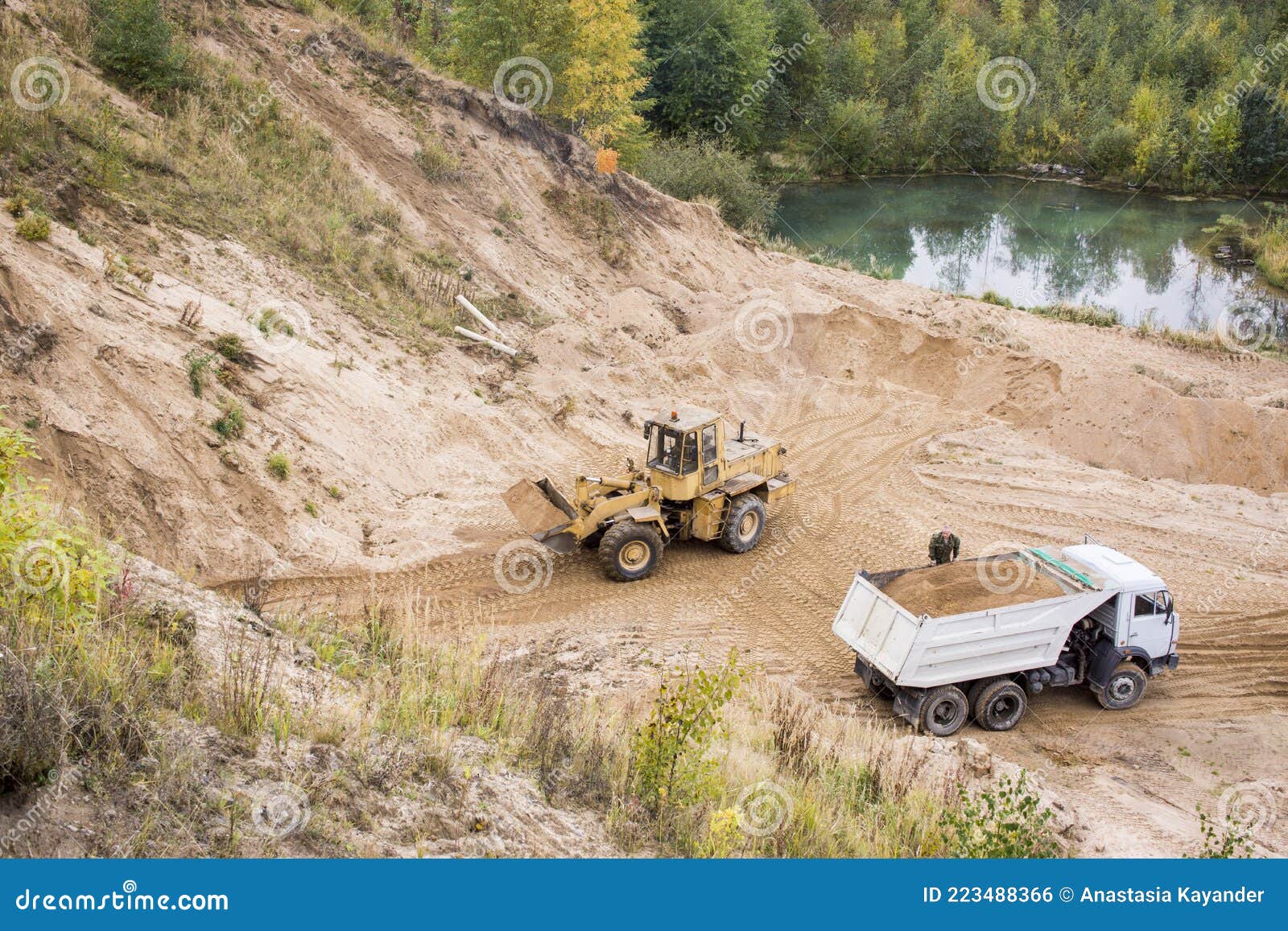 Mining Machinery Performing Operations. Excavator Working Digging in ...