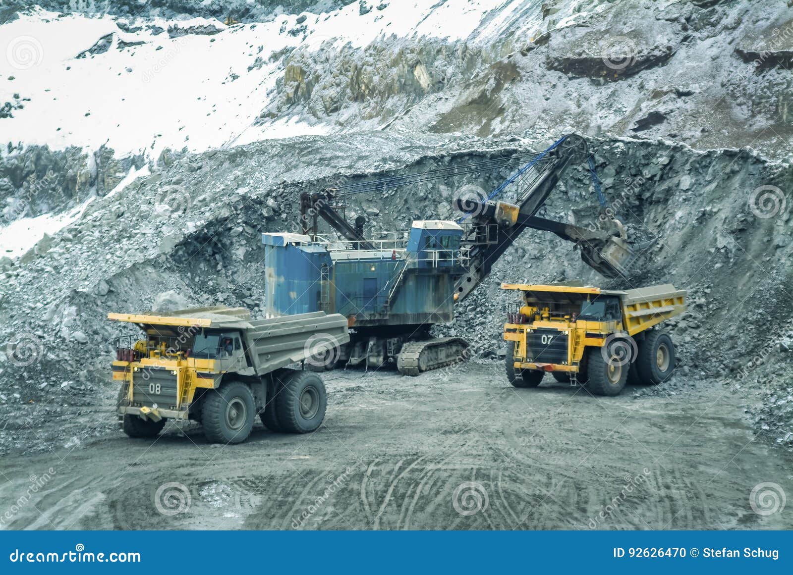 Mining Trucks and Loader stock photo. Image of trucks - 92626470